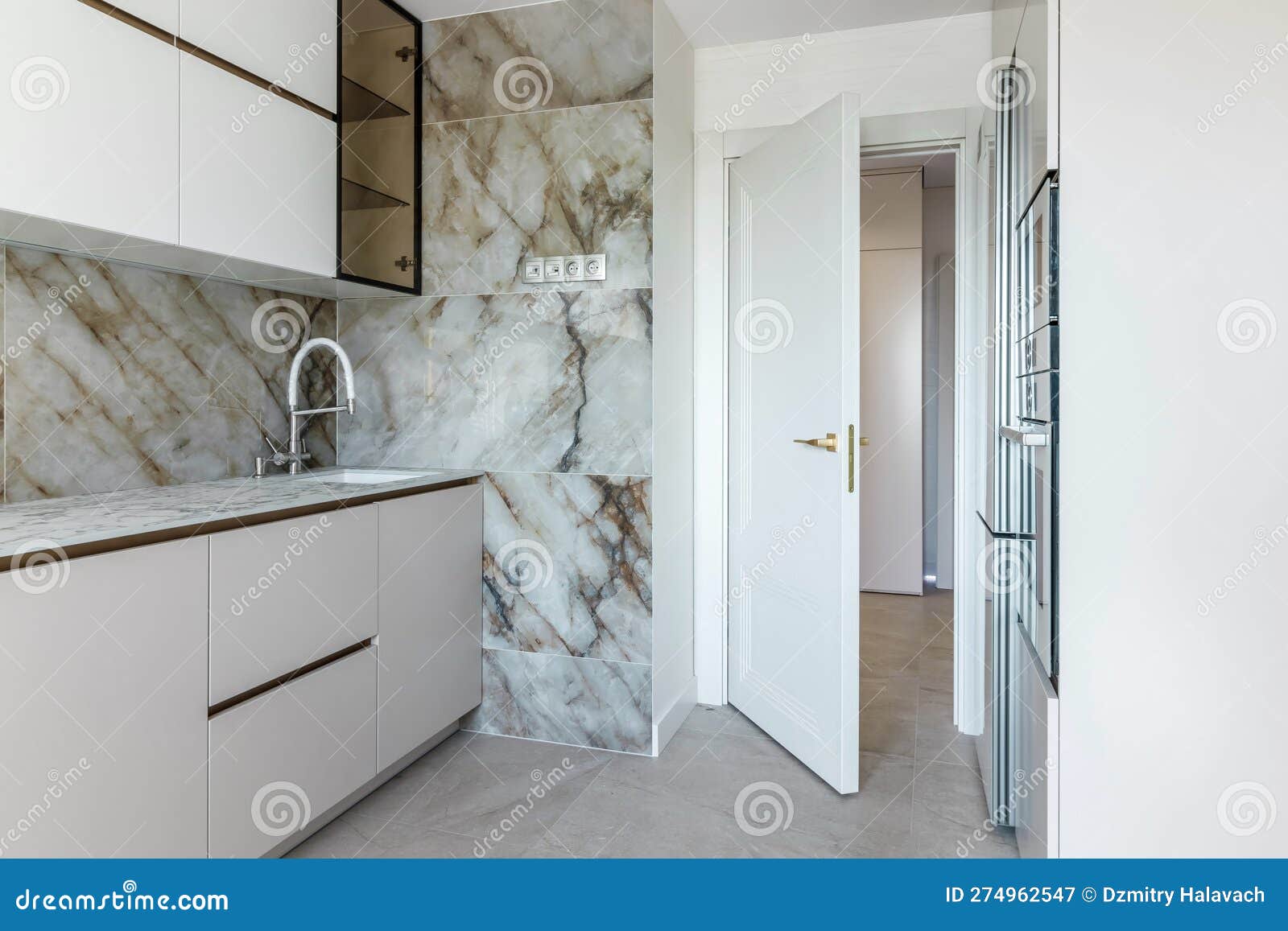 Modern Kitchen with Sink and Faucet White Door Exit from Kitchen Stock ...