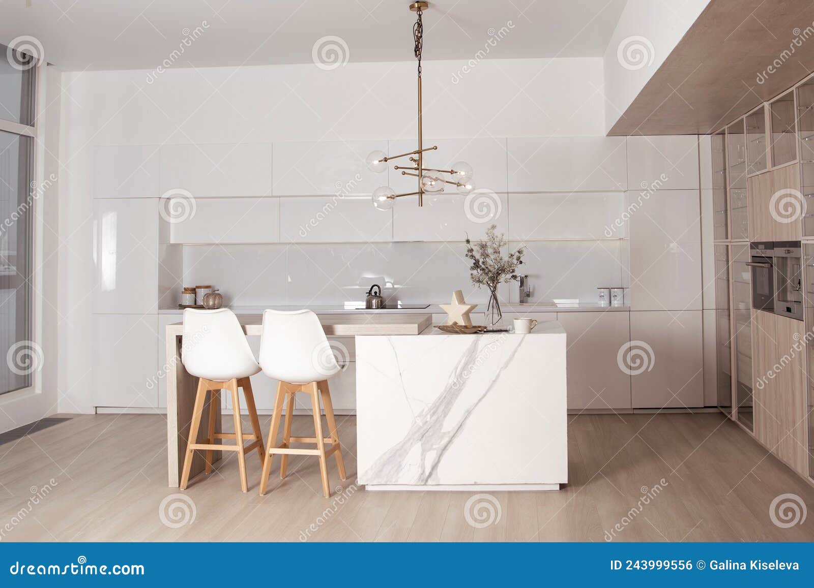 Modern Kitchen with Table and Chairs Stock Photo - Image of electronics ...