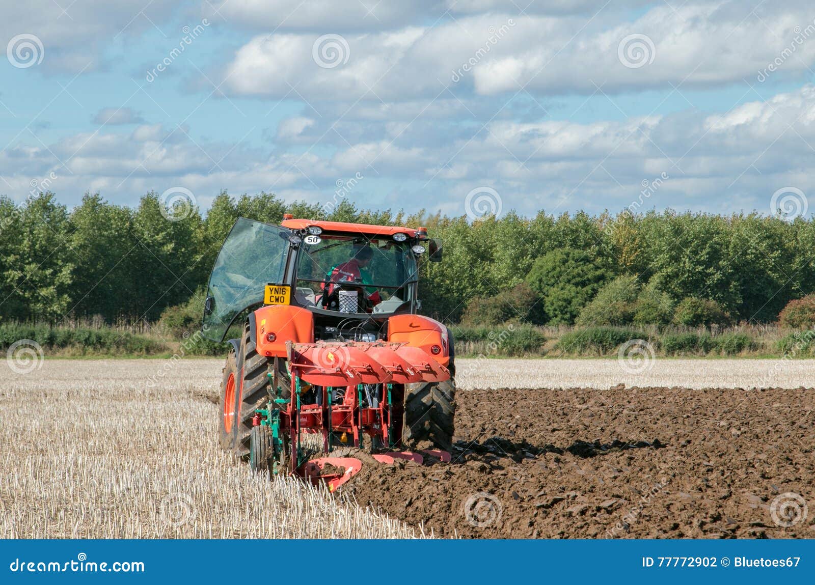 Modern Kubota Tractor Pulling a Plough Editorial Photography - Image of ...