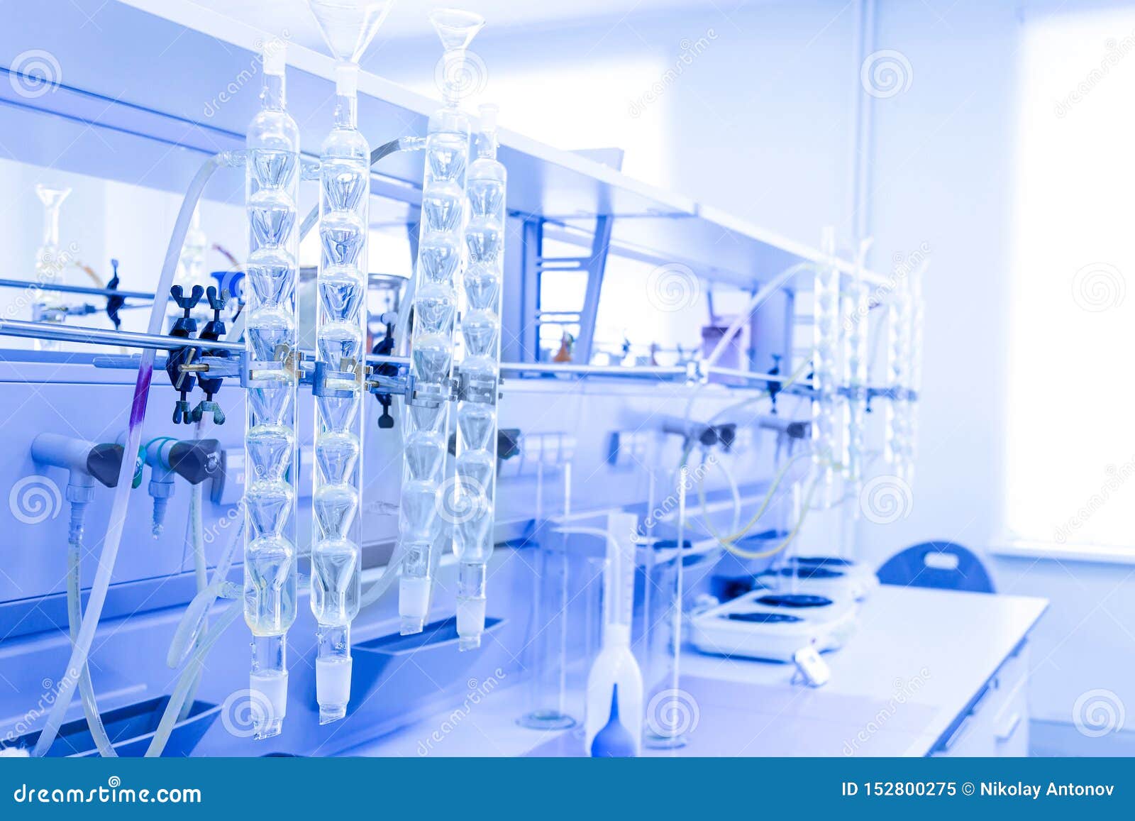 Modern Laboratory with Flasks Science or Education Background. Blue ...