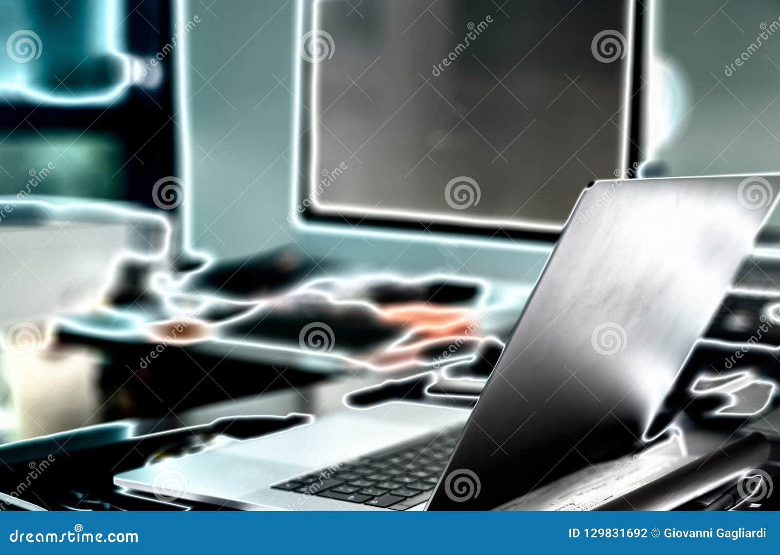 Modern Laptop on a Cluttered Business Desktop Stock Photo - Image of ...