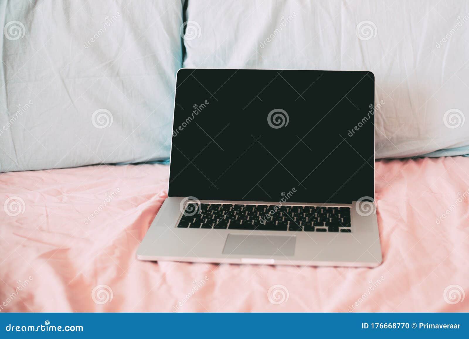 Modern Laptop Computer Lies on the Bed, Black Laptop Screen Stock Photo ...