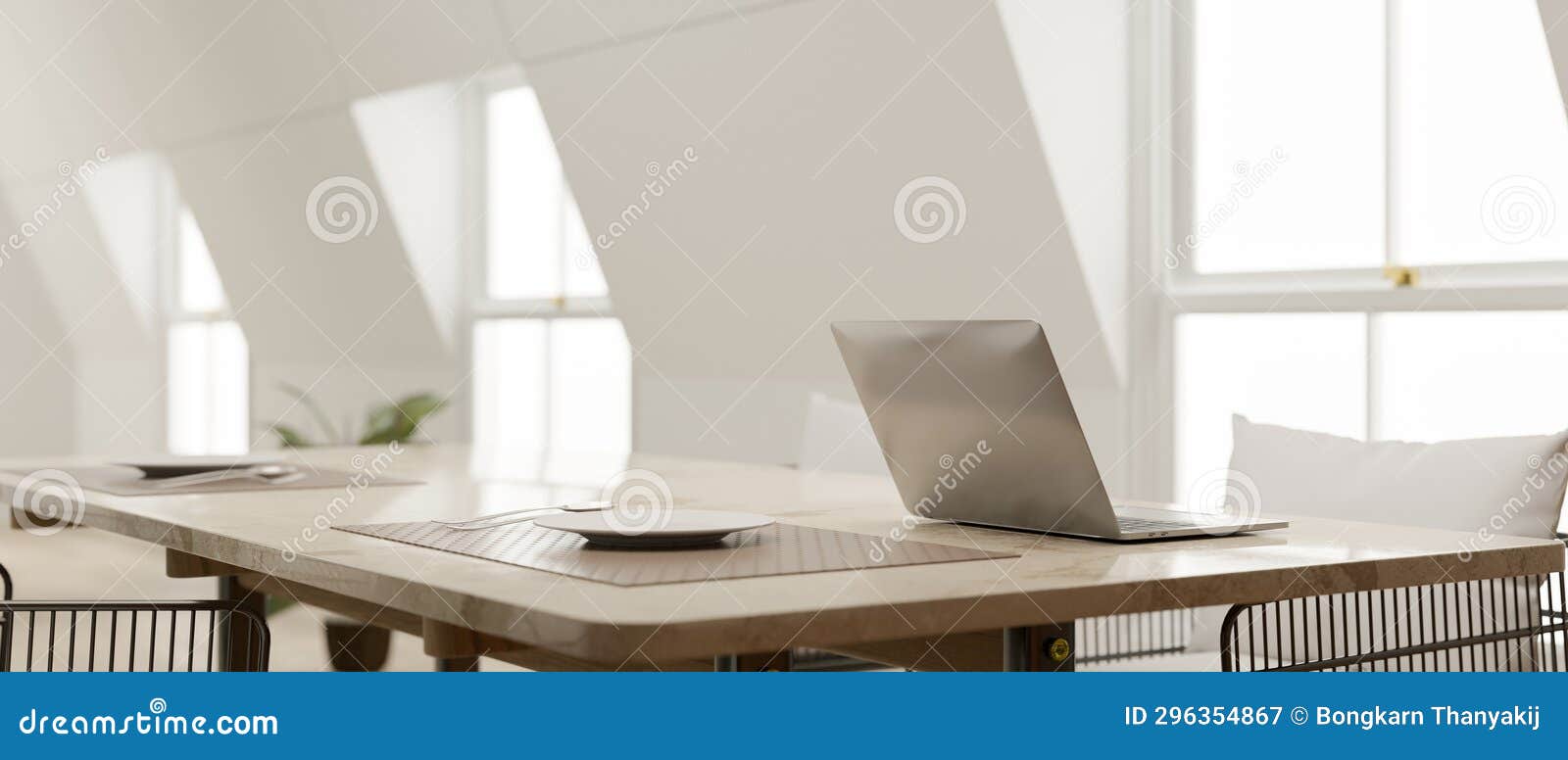 A Modern Laptop on a Dining Table in a Modern, Luxury White Dining Room ...