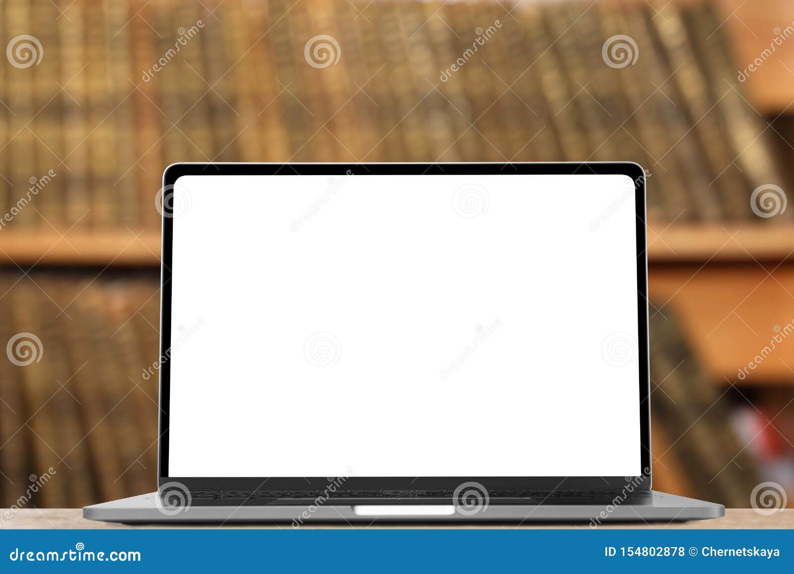 Modern Laptop with Empty Screen on Table in Library. Space for Stock ...