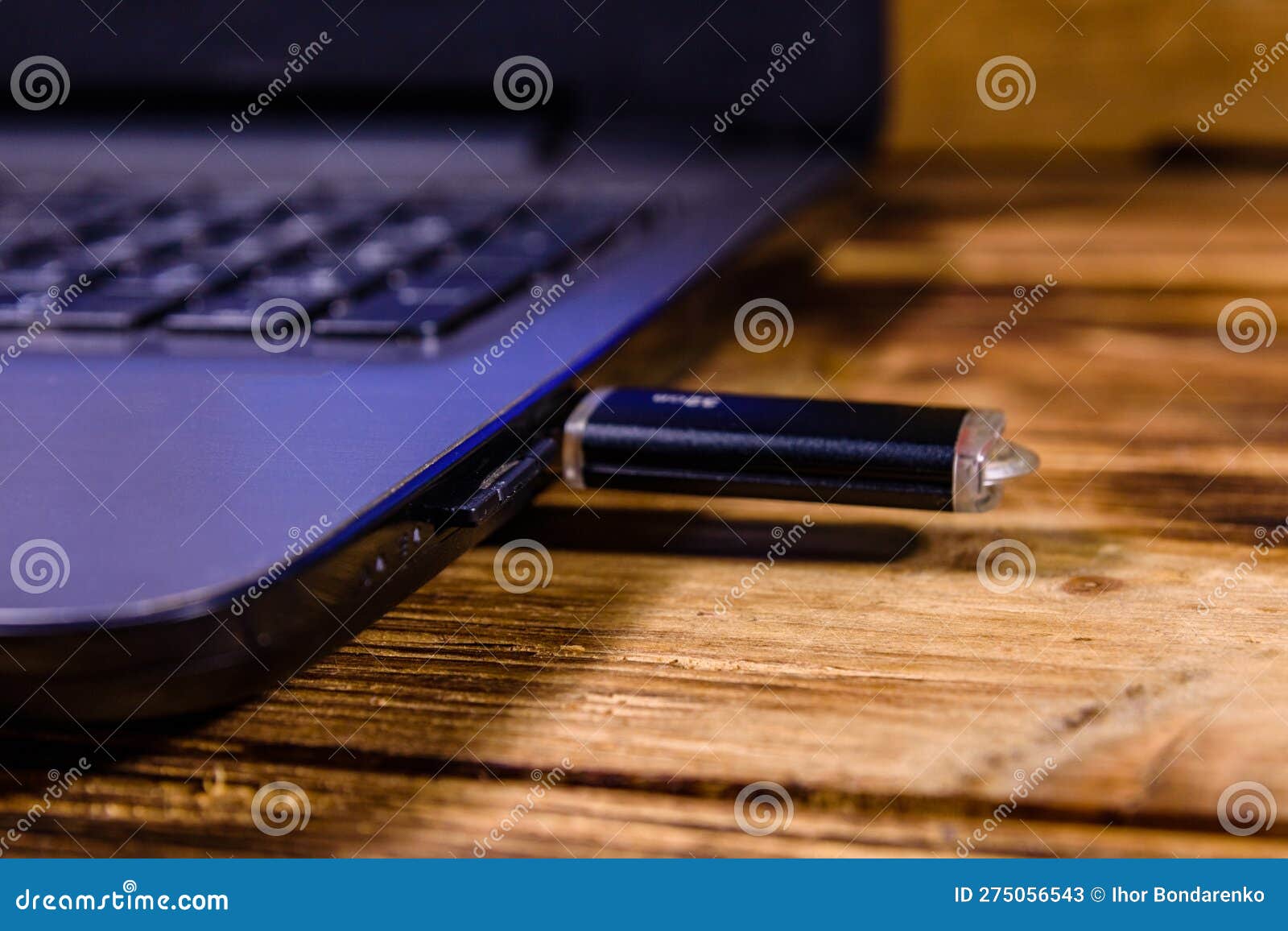 Modern Laptop and Flash Memory Card on a Wooden Desk Stock Image ...