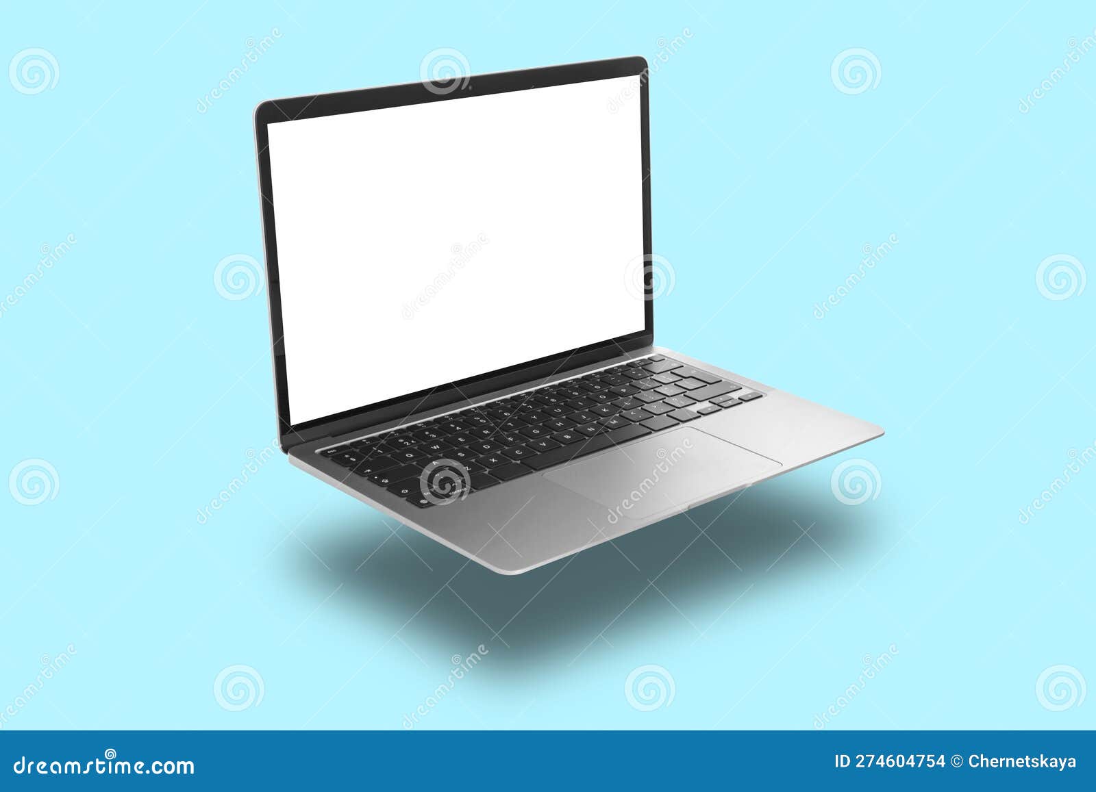 Modern Laptop Flying on Light Blue Background Stock Photo - Image of ...