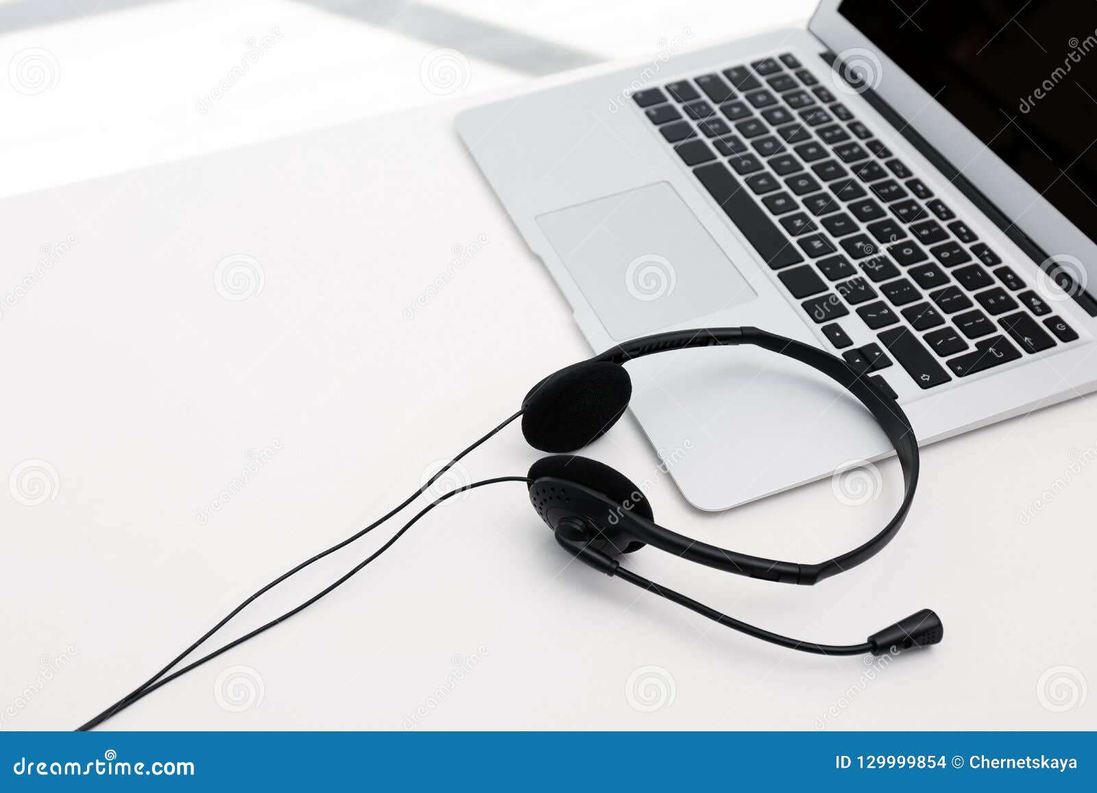 Modern Laptop and Headset on Table Stock Photo - Image of problems ...