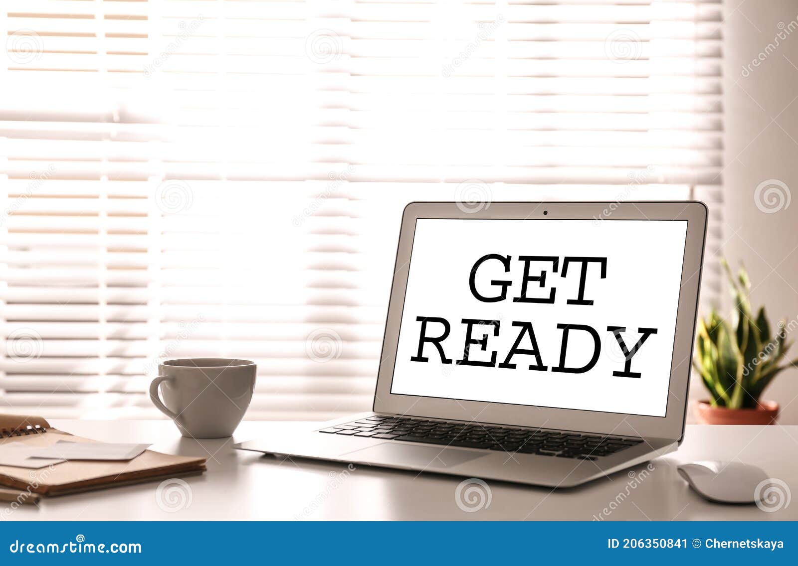 Modern Laptop with Phrase Get Ready on Screen in Office Stock Image ...