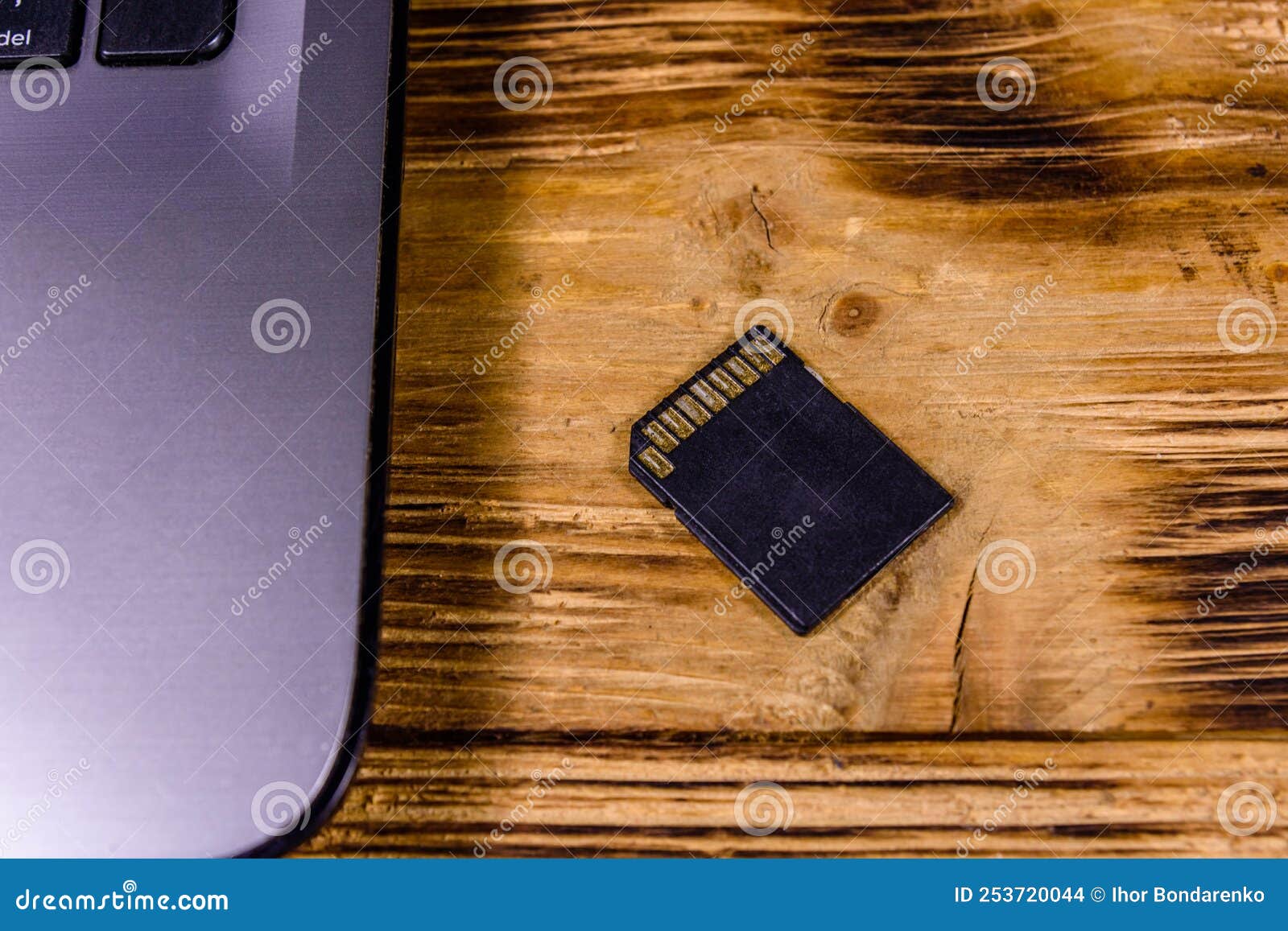 Modern Laptop and Sd Memory Card on a Wooden Desk Stock Photo - Image ...