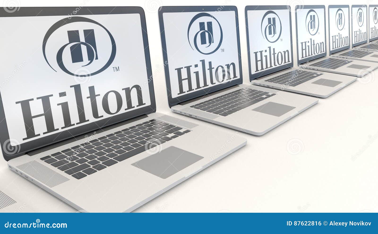 Modern Laptops with Hilton Hotels Resorts Logo. Computer Technology ...