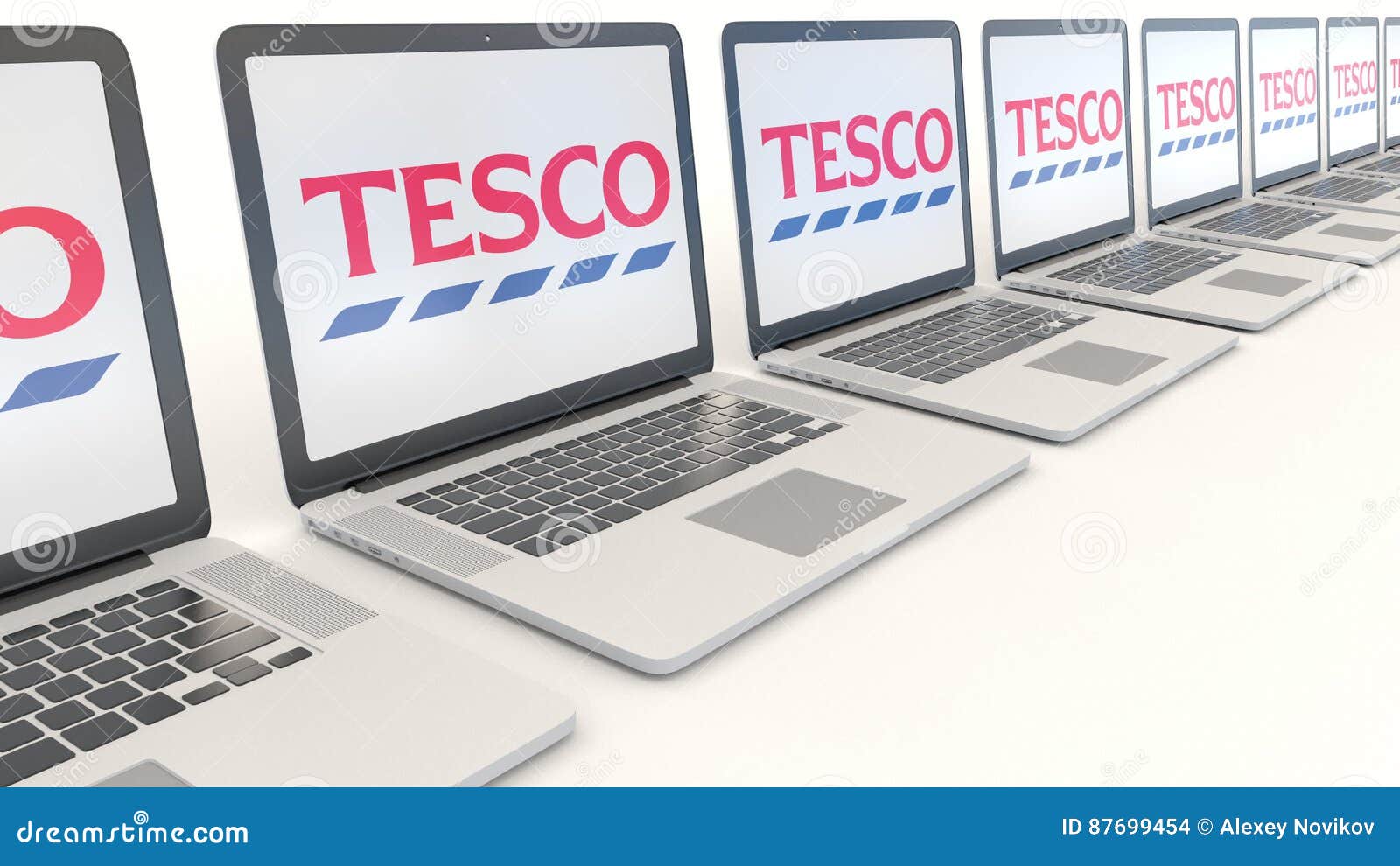 Modern Laptops with Tesco Logo. Computer Technology Conceptual ...