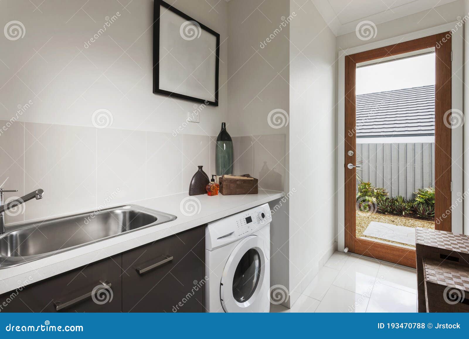 A Modern Laundry Room in Luxury House Stock Photo - Image of interior ...