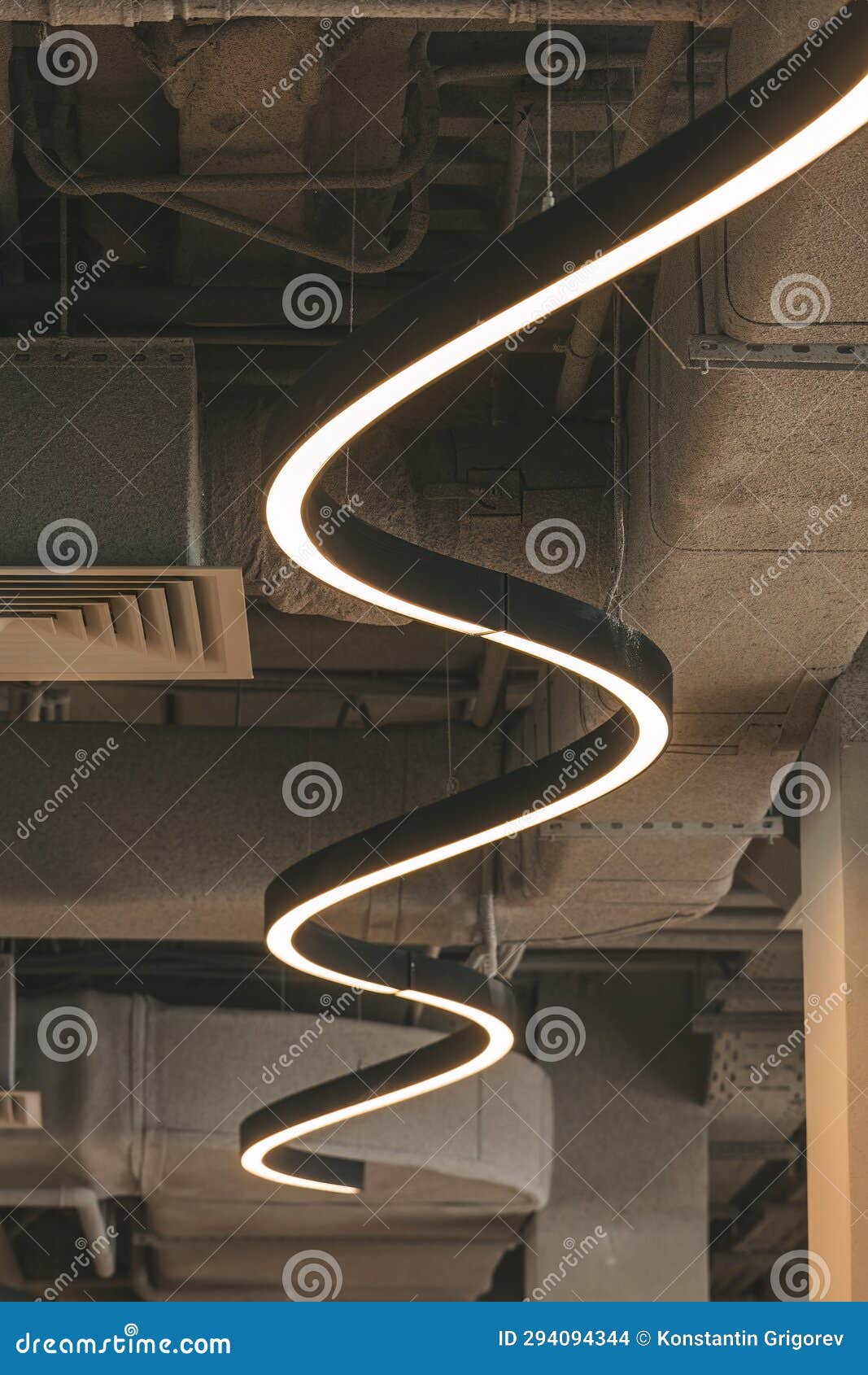 Modern LED Lighting by Curved Lamp in Industrial Interior. Ceiling in ...