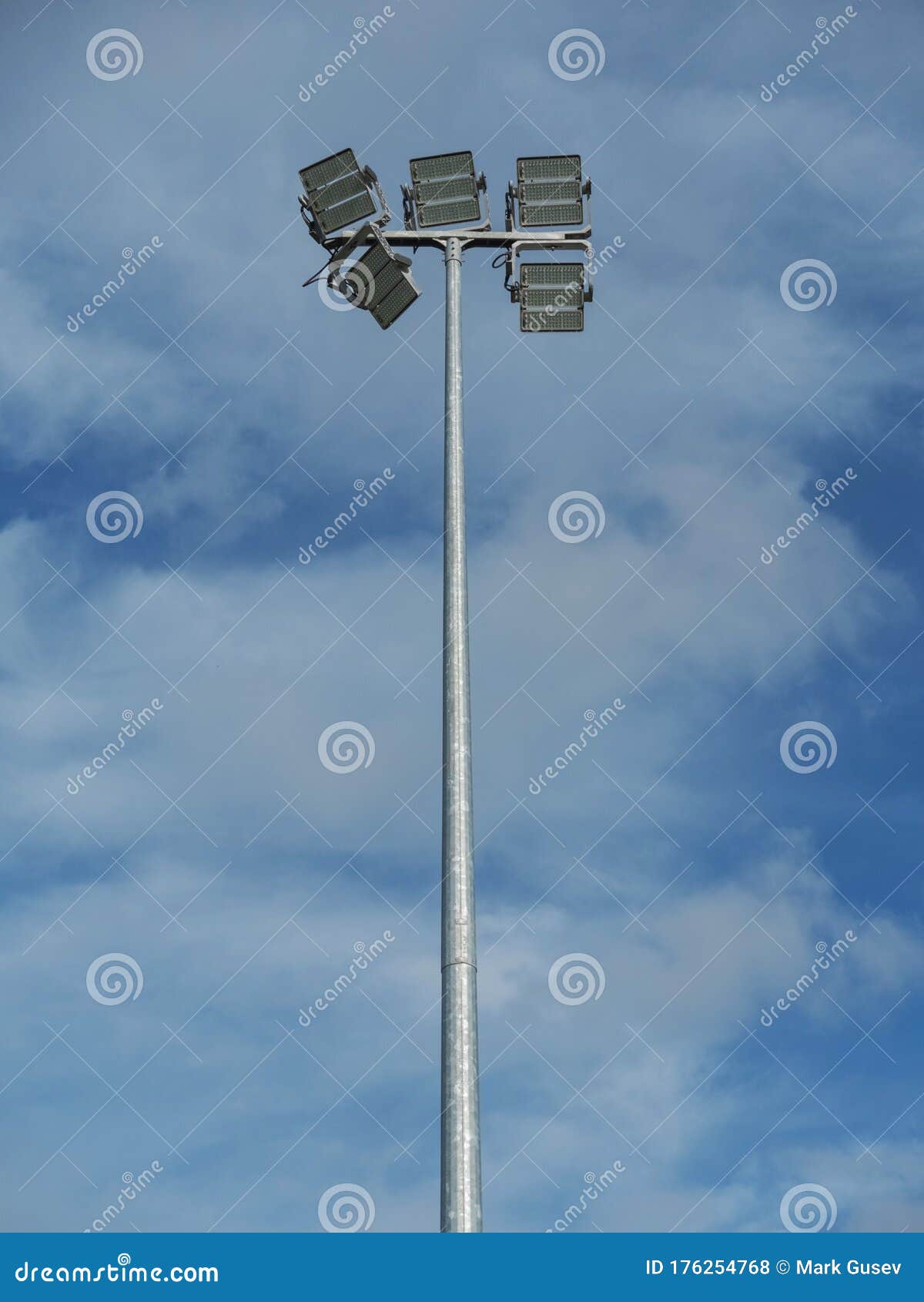 Modern LED Lights on a Poles Against a Cloudy Blue Background Stock ...