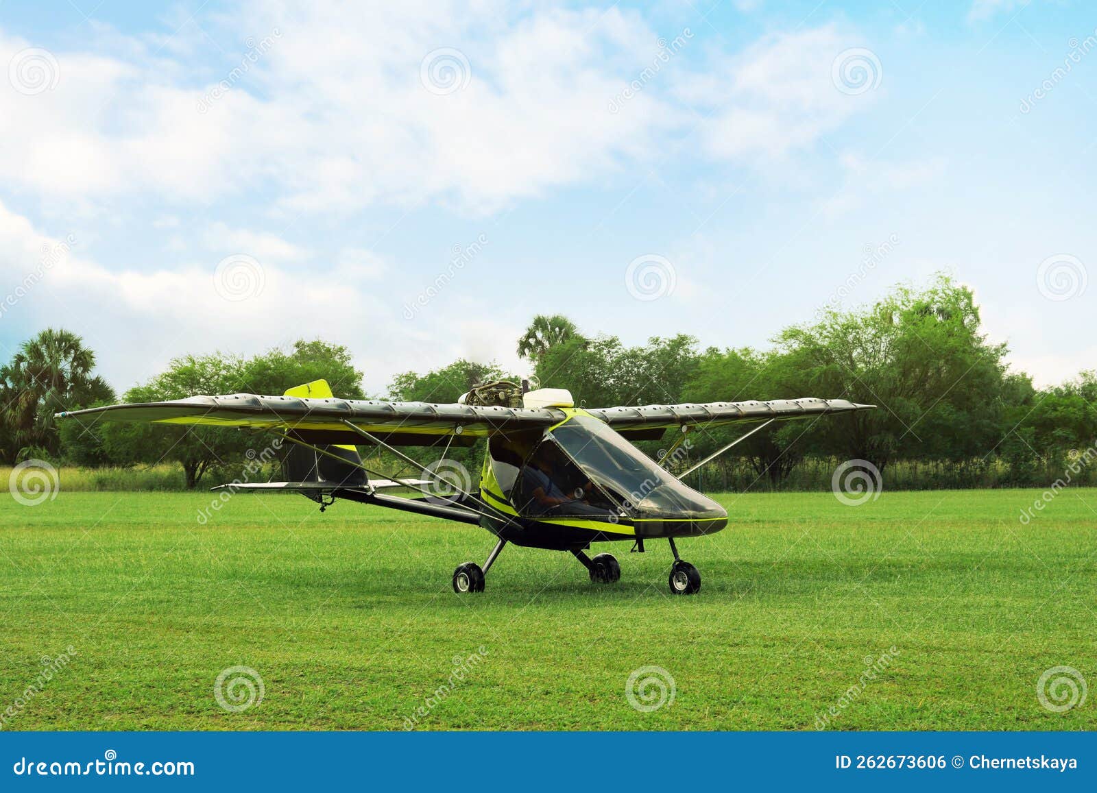 Modern Light Aircraft on Green Grass Outdoors Stock Photo - Image of ...