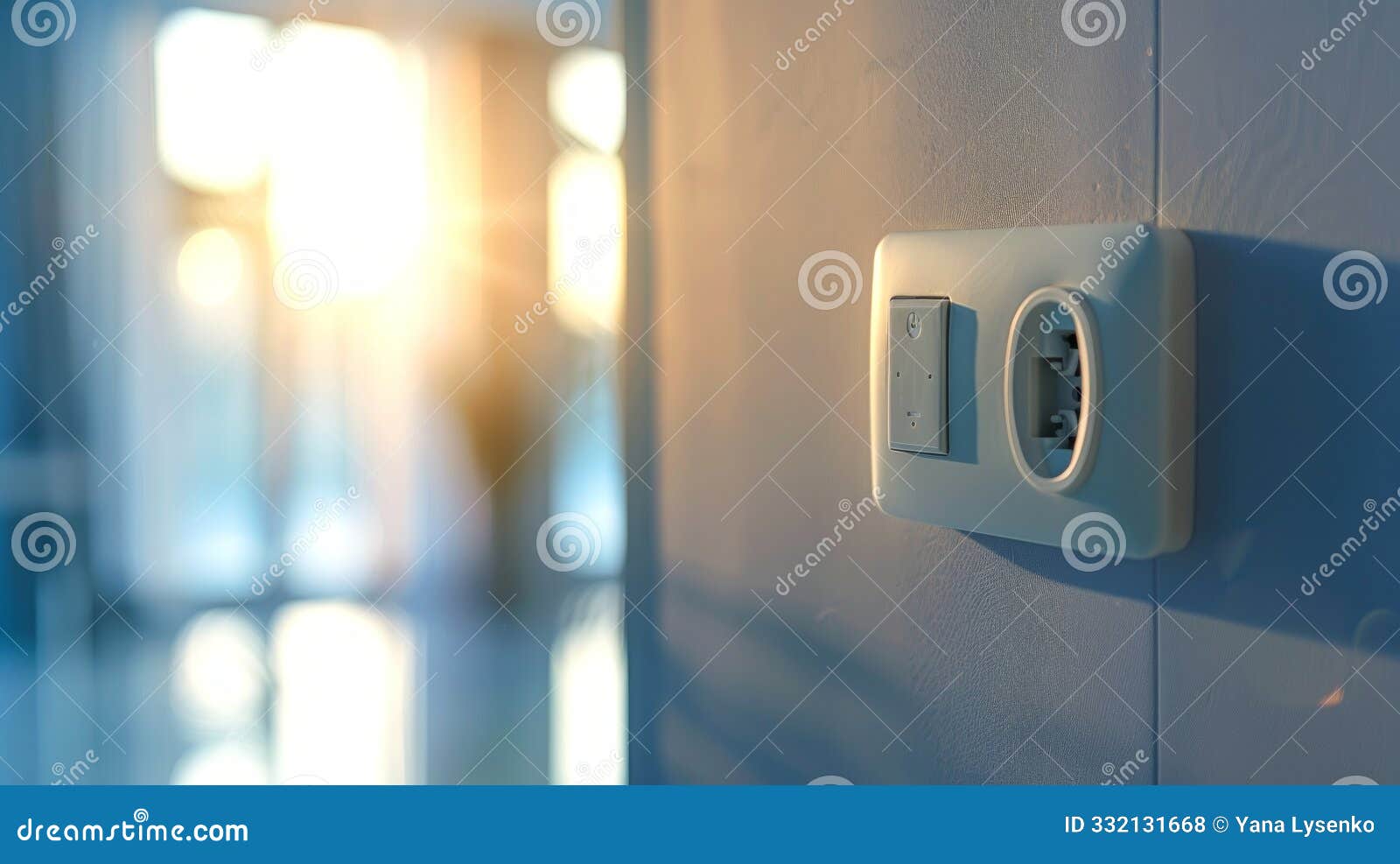 Modern Light Switch and Electrical Outlet on a Wall with Soft Morning ...