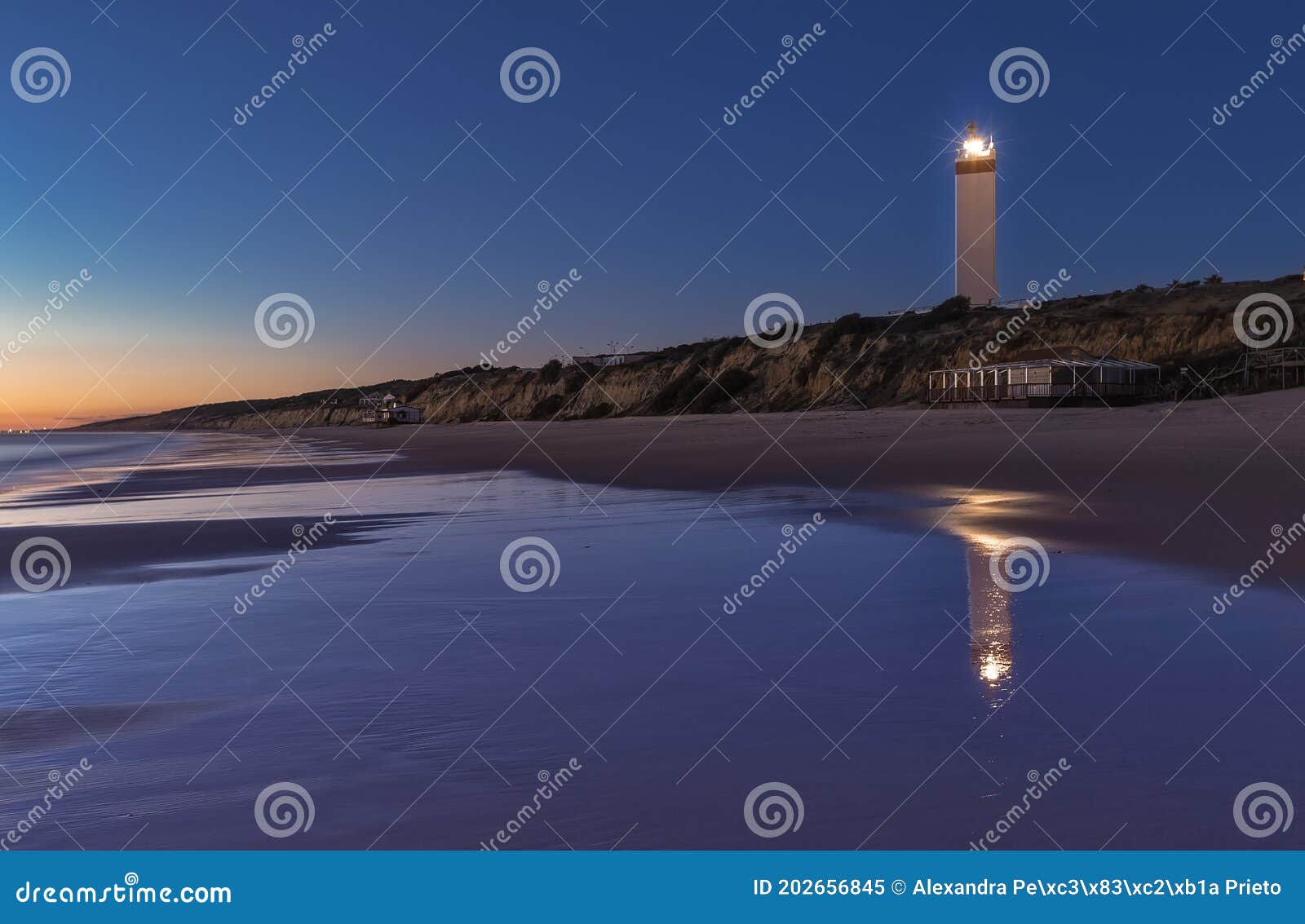 Modern lighthouse at night stock image. Image of remains - 202656845