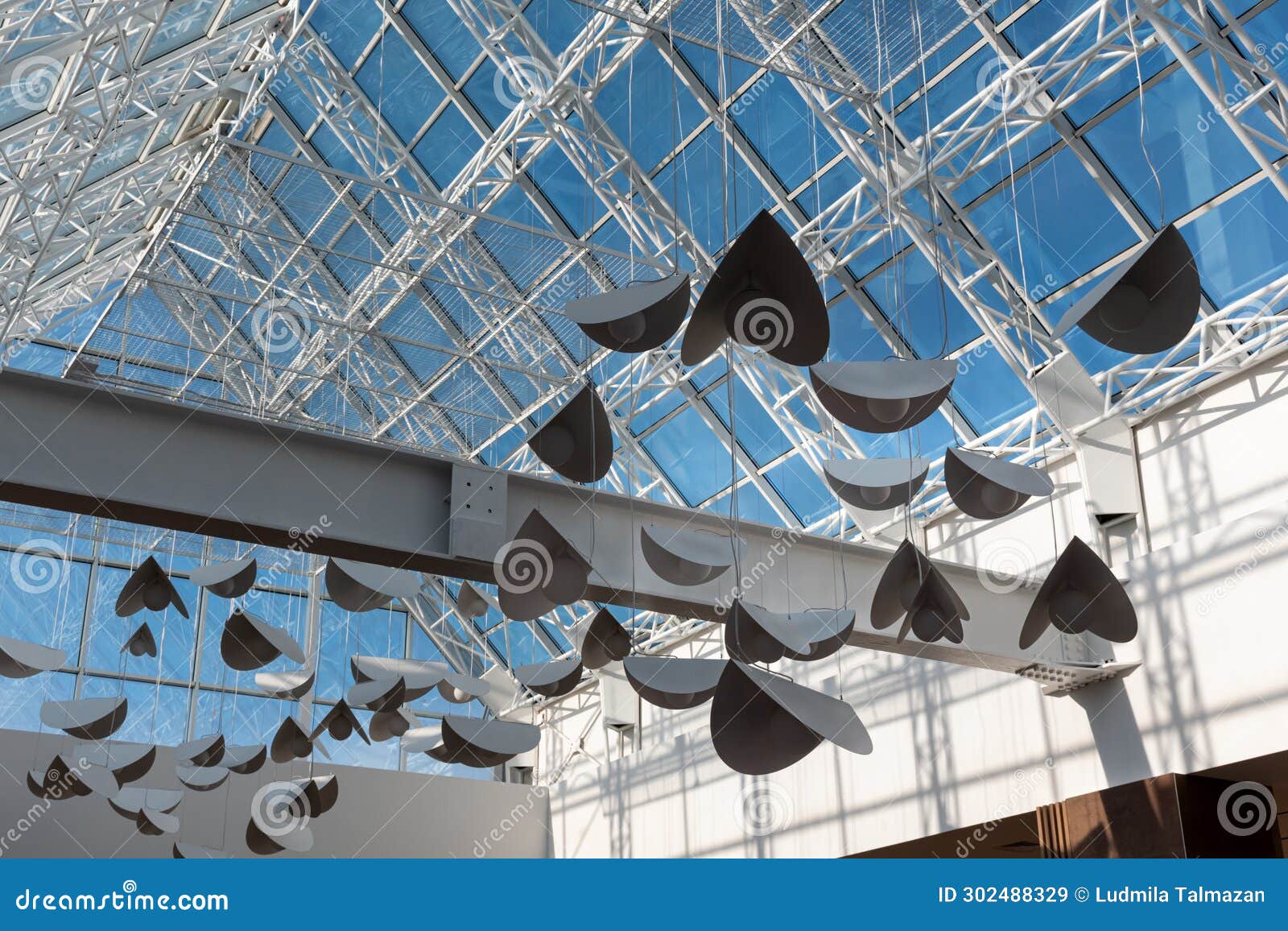 Modern Lighting Fixtures on the Background of Glass Ceiling Stock Image ...