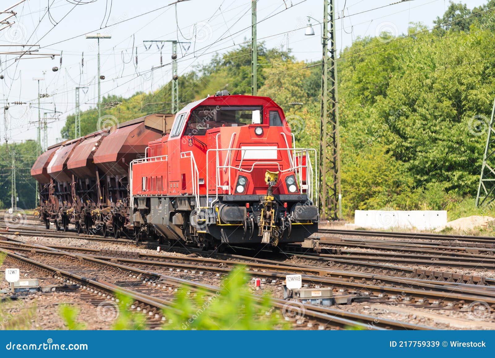 Modern Locomotive with a Freight Train during Daylight Stock Image ...