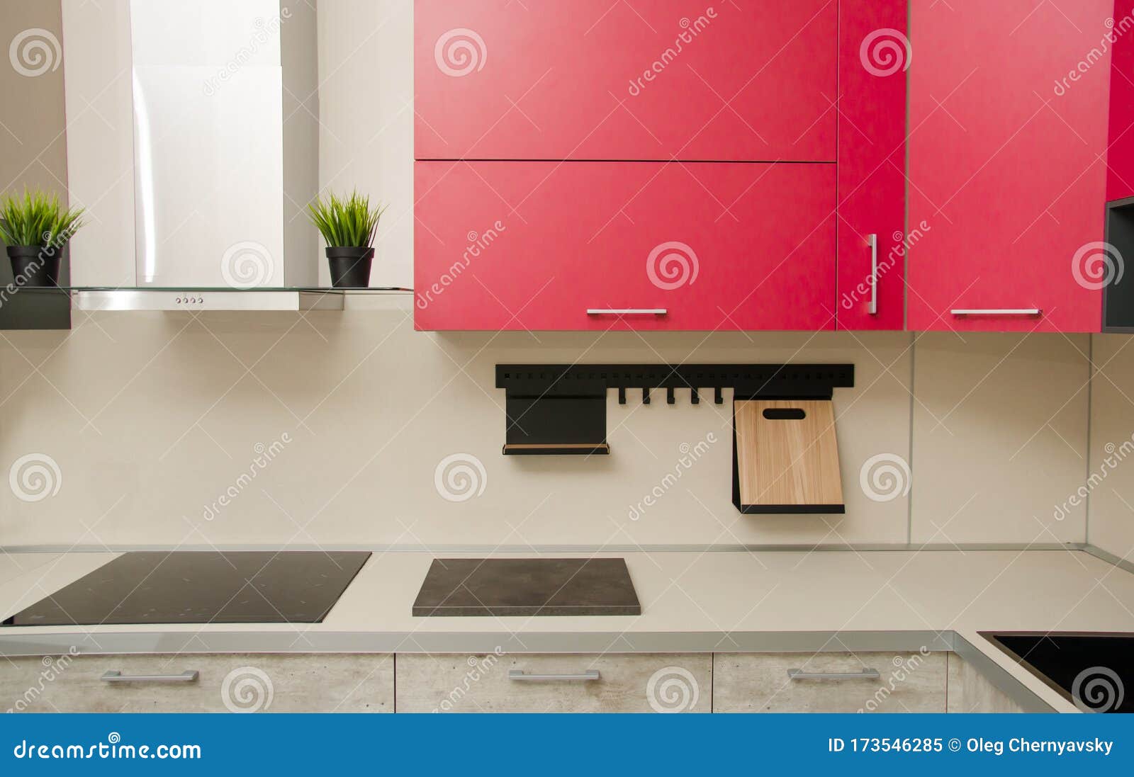 Modern Loft-style Kitchen with Red Cabinets, Stove, Range Hood and ...