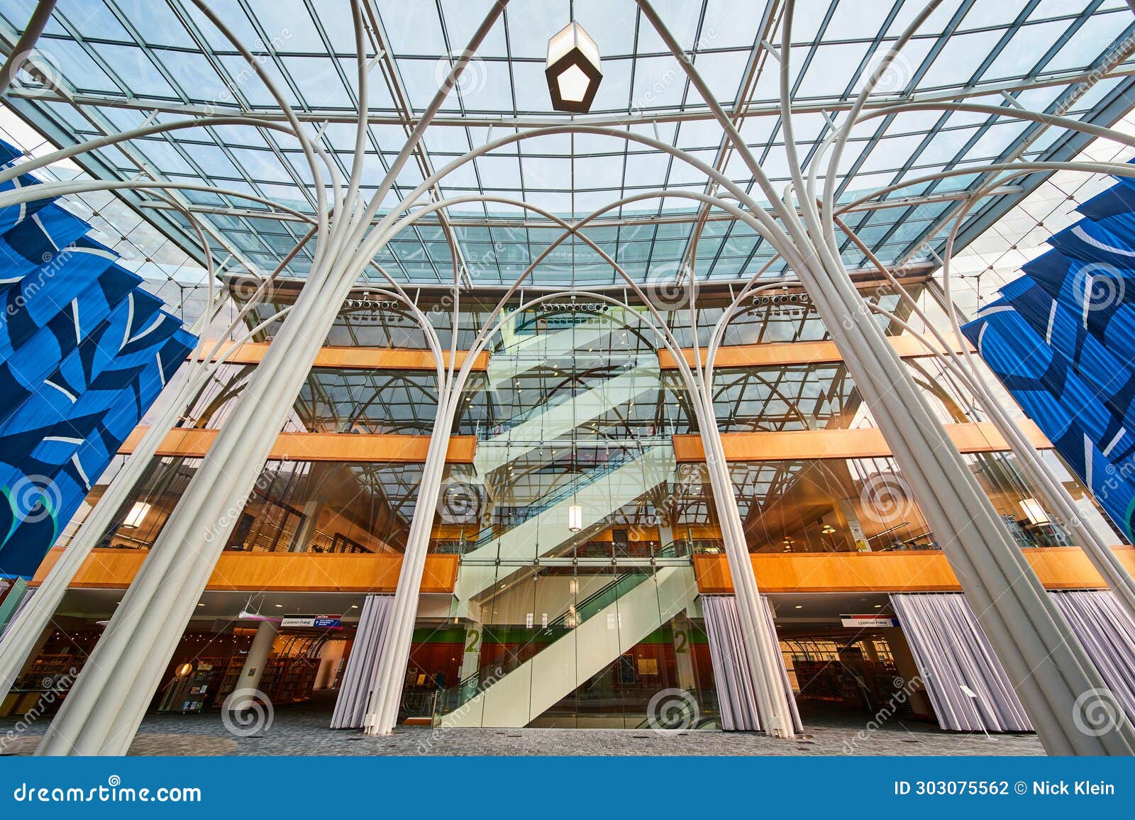 Modern Mall Interior with Glass Ceiling and Elevator Shaft ...