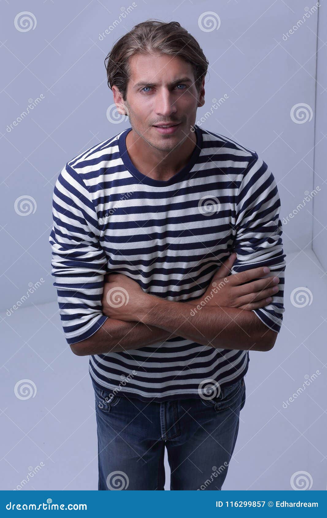 Modern Man Standing in the Corner of the White Room . Stock Image ...