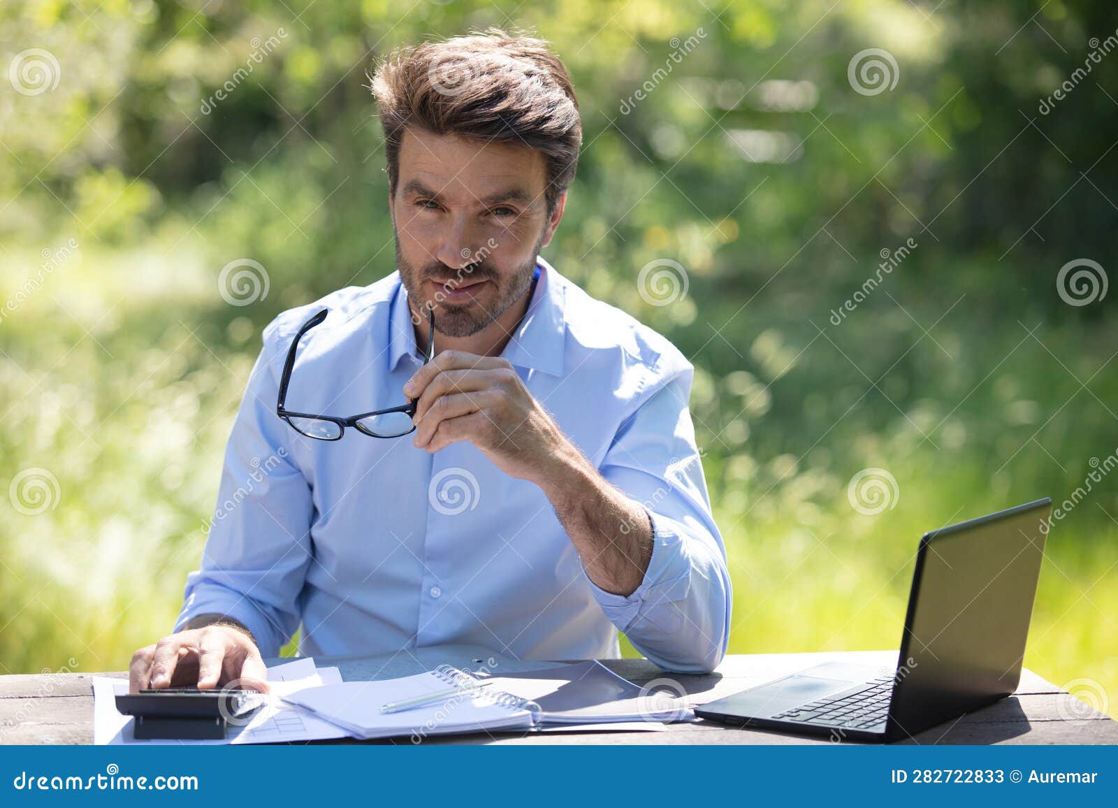 Modern Man Working or Using Laptop Outside Stock Image - Image of happy ...