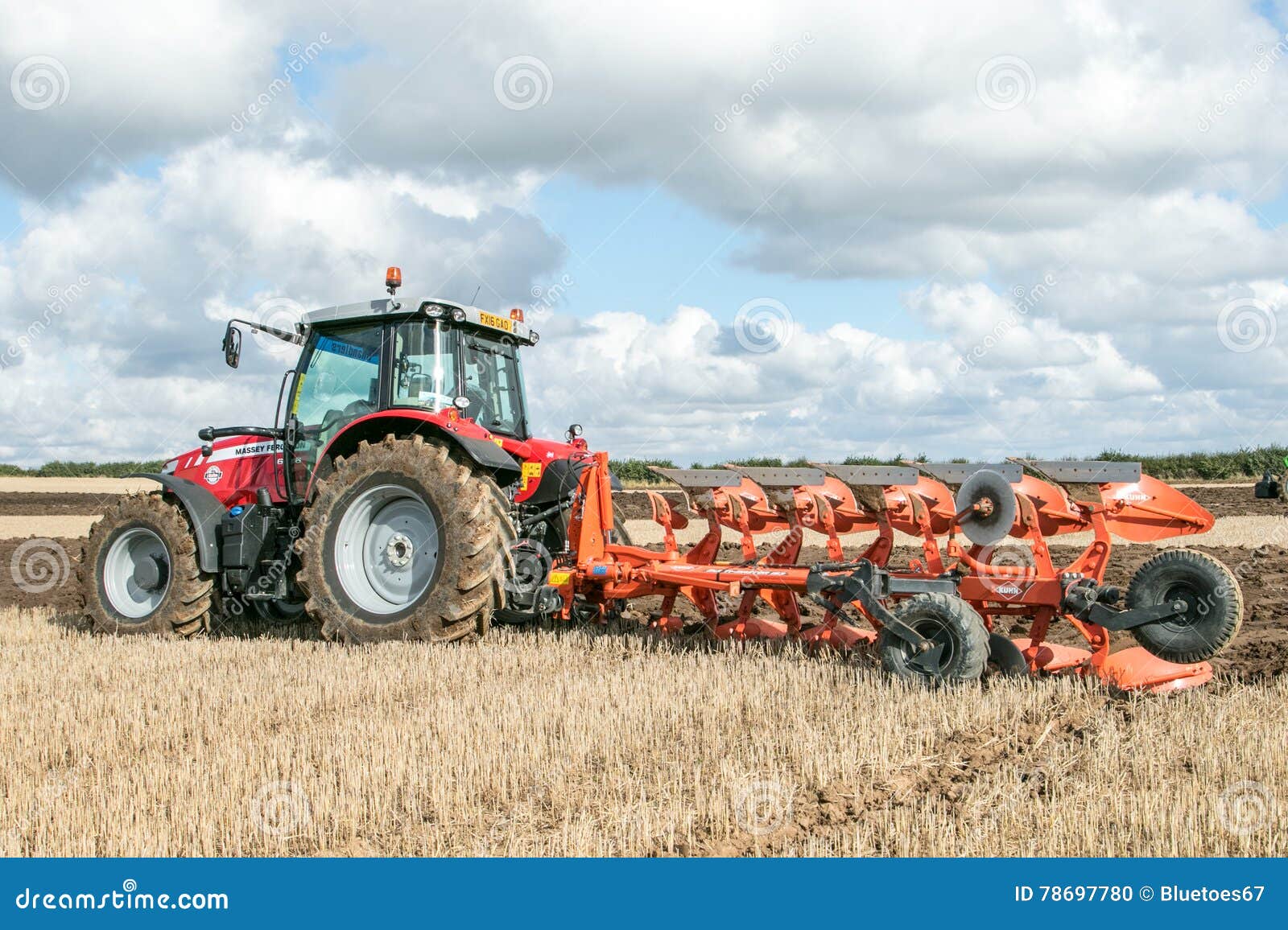 Modern Massey Ferguson Tractor Pulling A Plough Editorial Photo ...