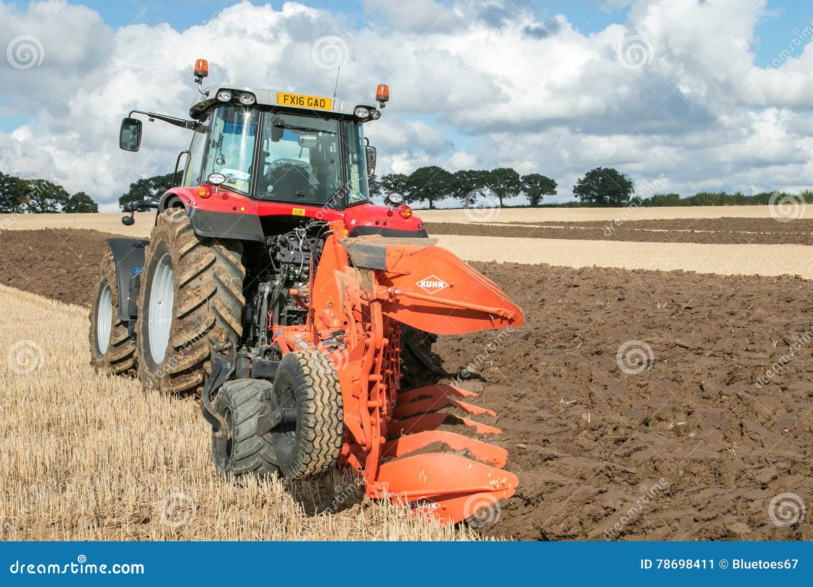 Modern Massey Ferguson Tractor Pulling A Plough Editorial Image ...