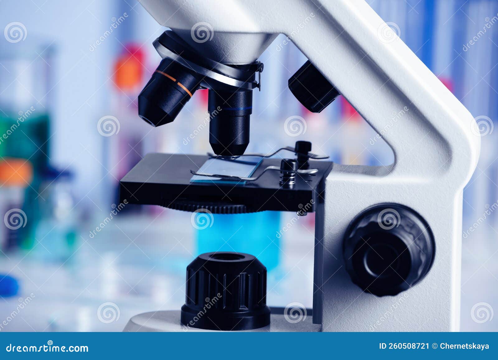 Modern Medical Microscope Against Blurred Background, Closeup Stock ...
