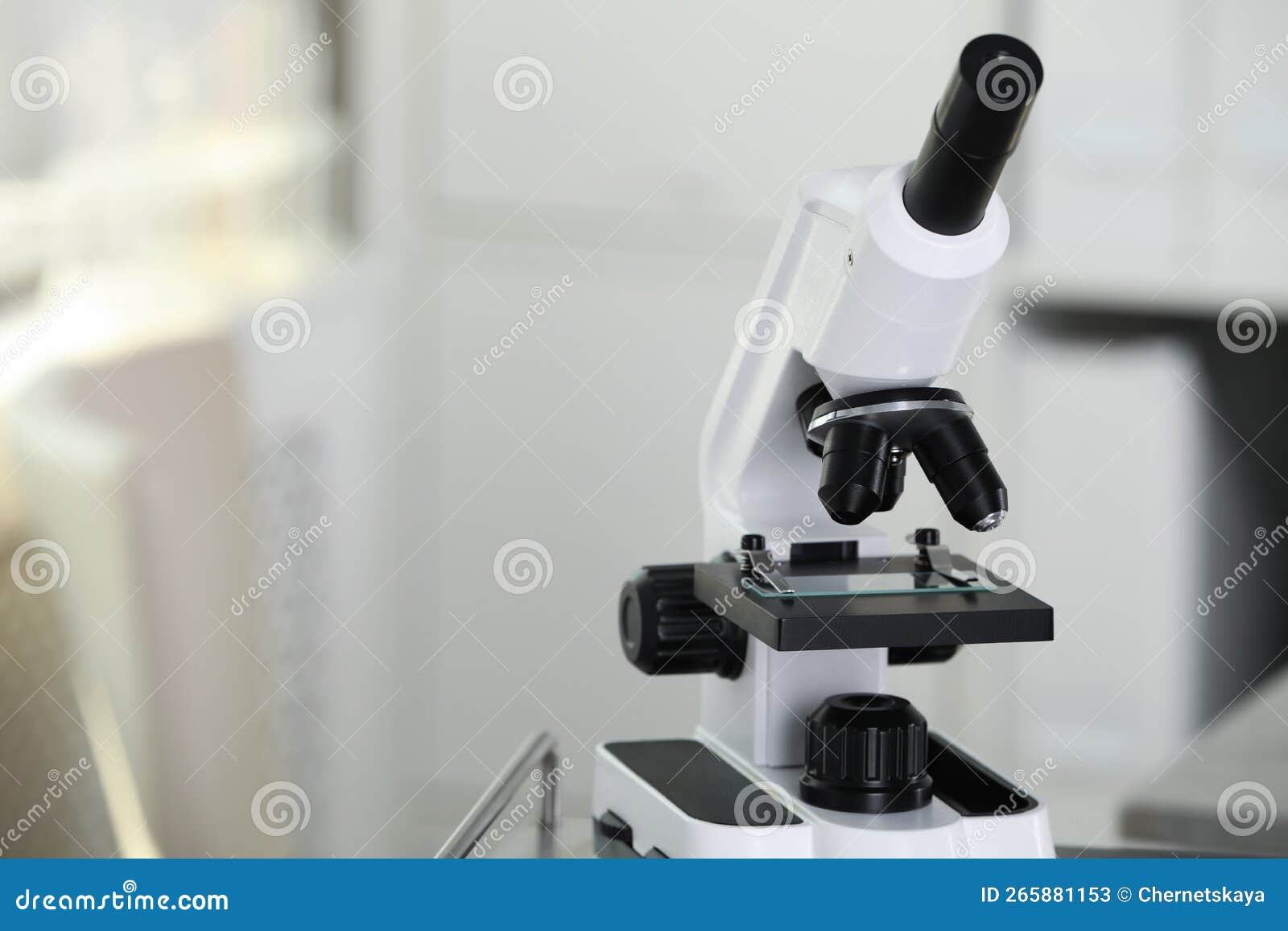 Modern Medical Microscope on Blurred Background, Closeup with Space for ...