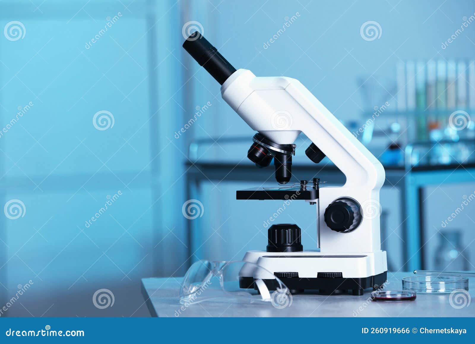 Modern Medical Microscope on Gray Table in Laboratory, Space for Text ...