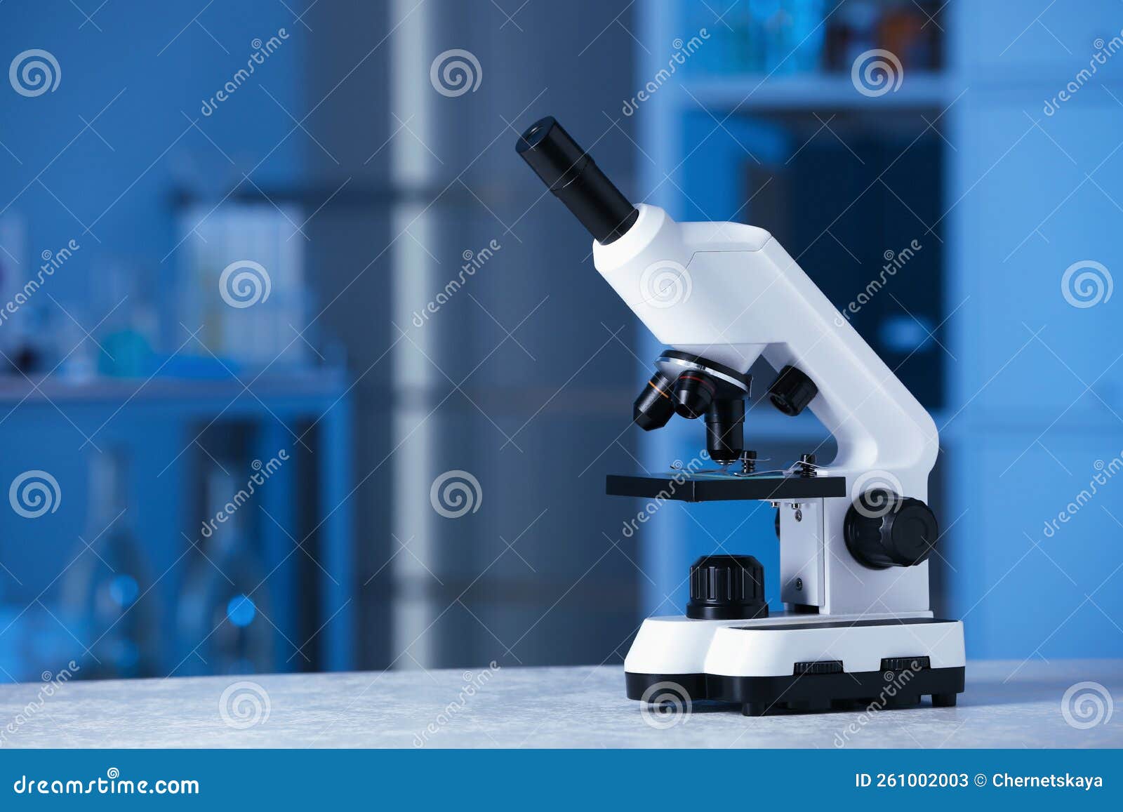 Modern Medical Microscope on Gray Table in Laboratory, Space for Text ...