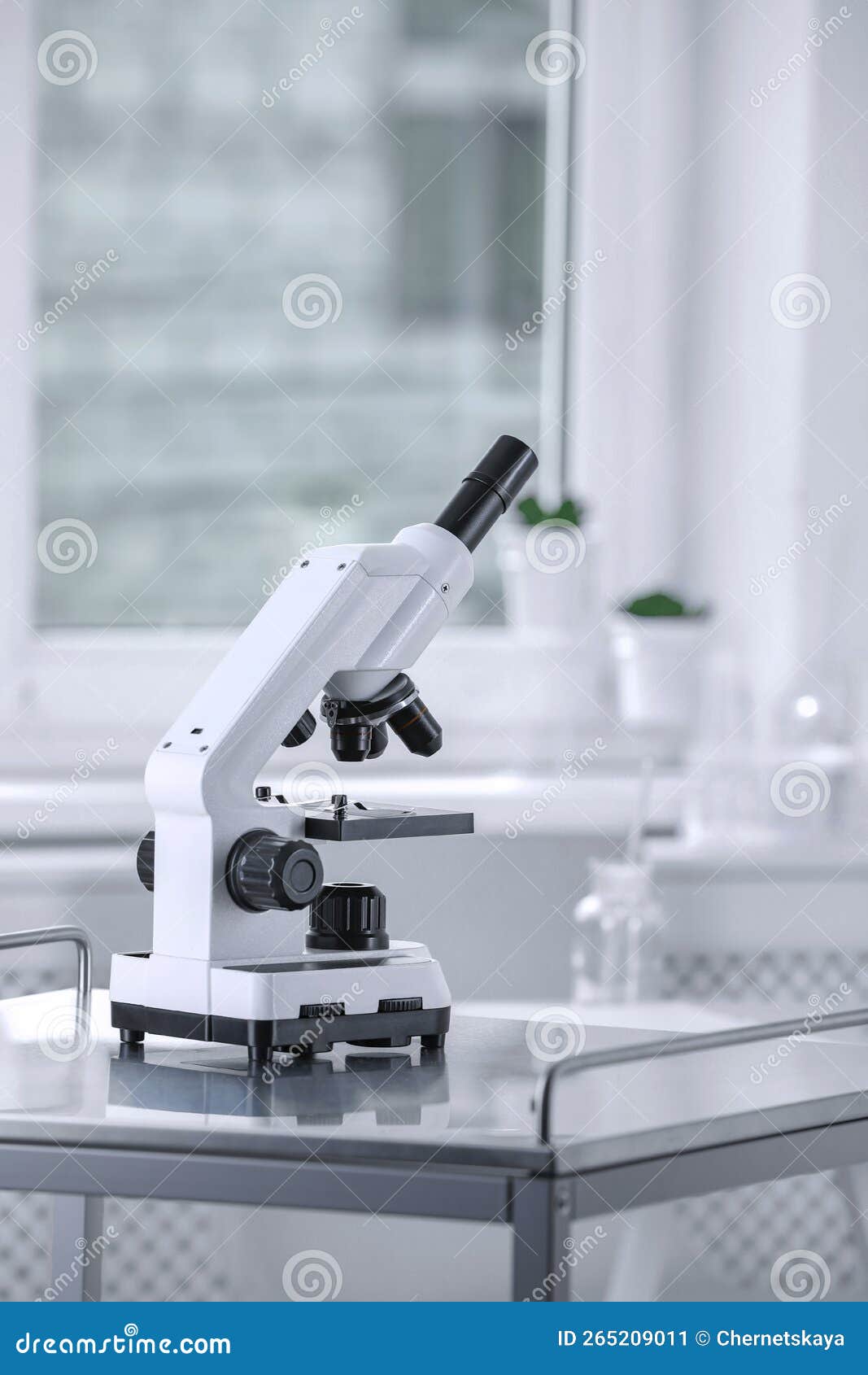 Modern Medical Microscope on Metal Table in Laboratory Stock Image ...