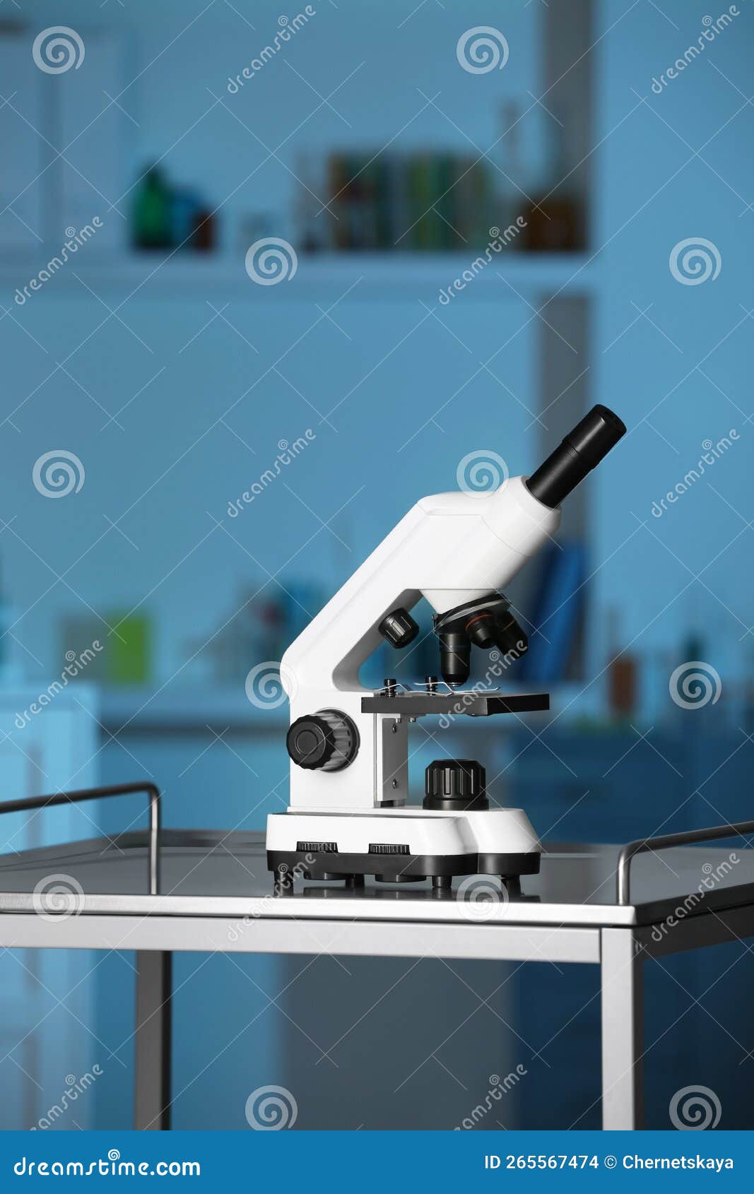 Modern Medical Microscope on Metal Table in Laboratory Stock Photo ...