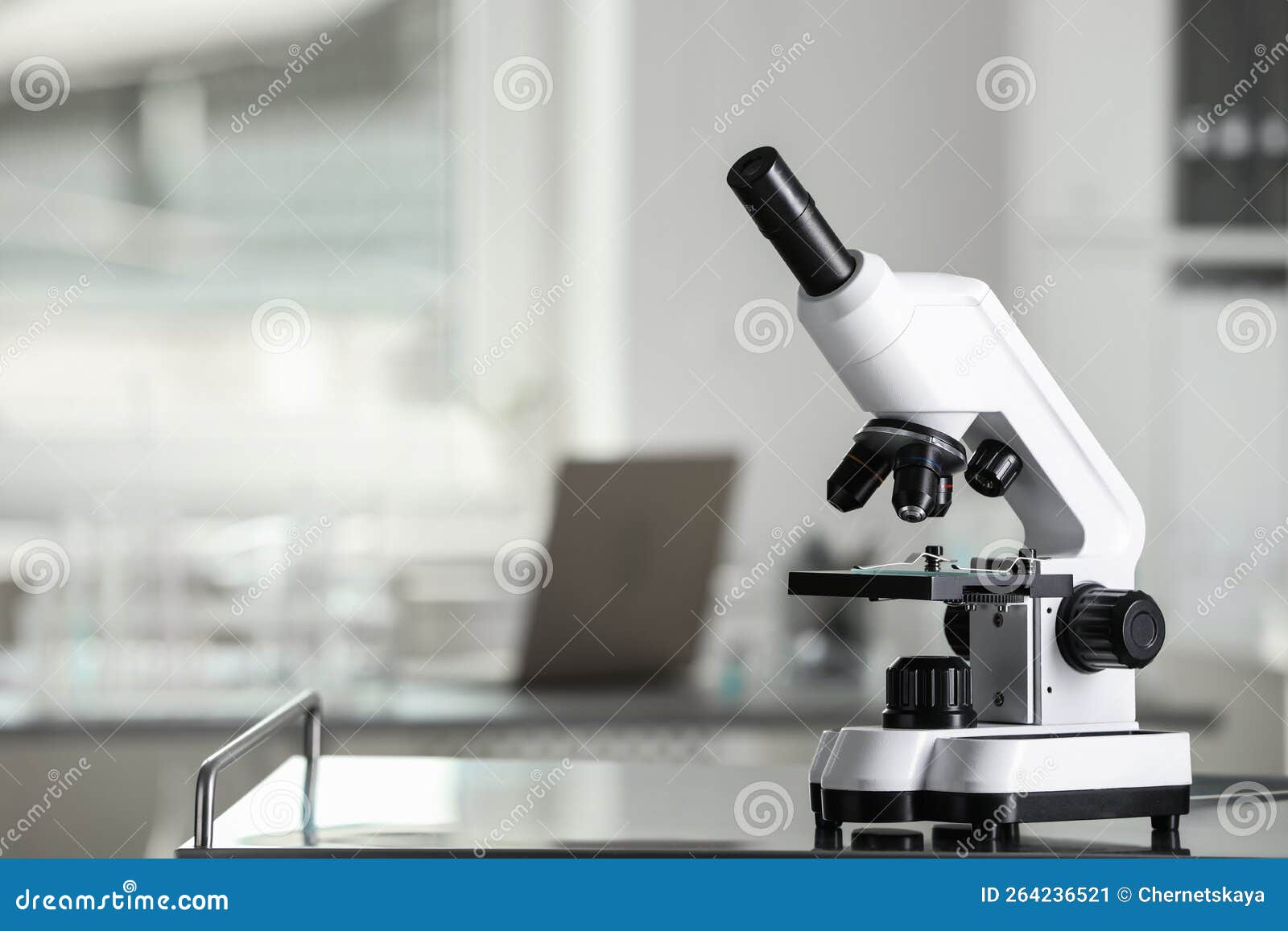 Modern Medical Microscope on Metal Table in Laboratory, Space for Text ...