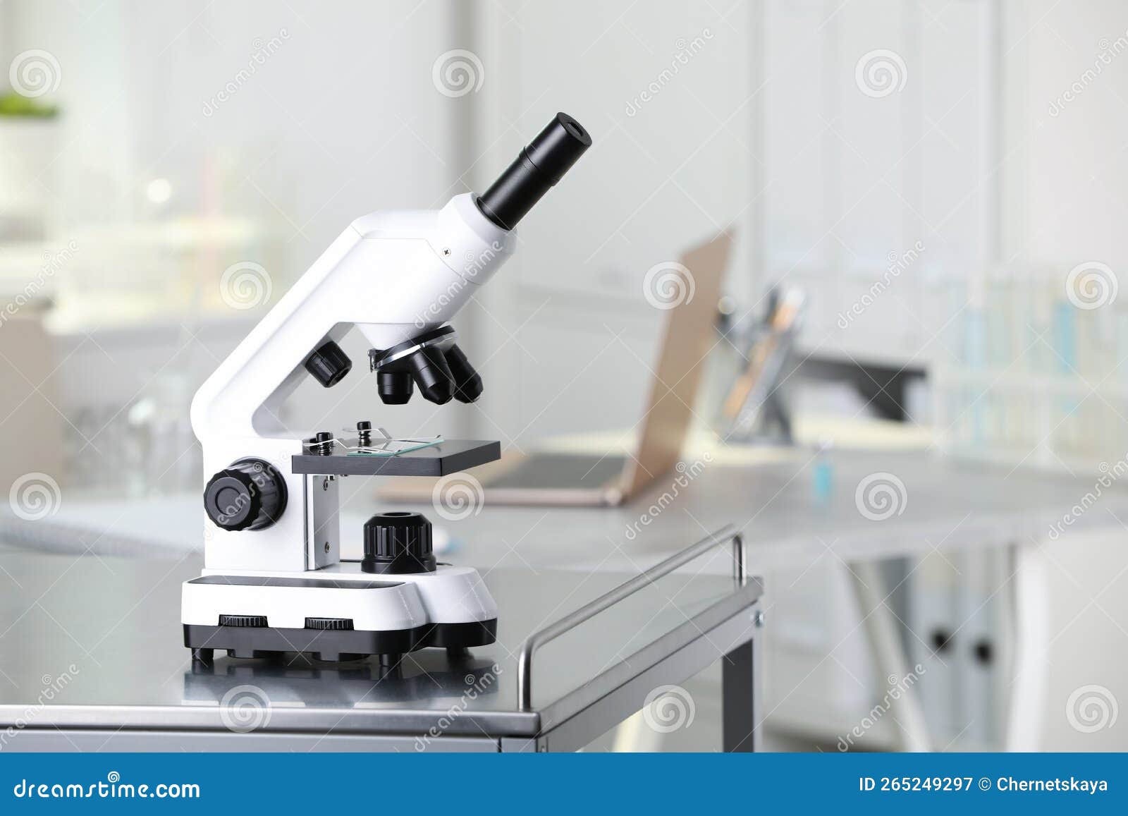 Modern Medical Microscope on Metal Table in Laboratory. Space for Text ...