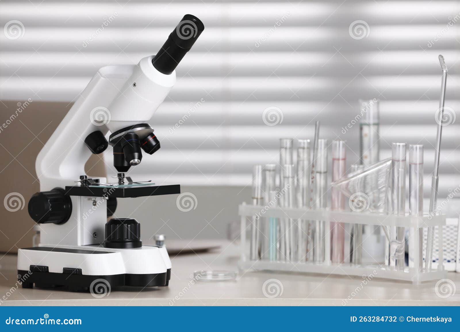 Modern Medical Microscope on Wooden Table in Laboratory, Space for Text ...