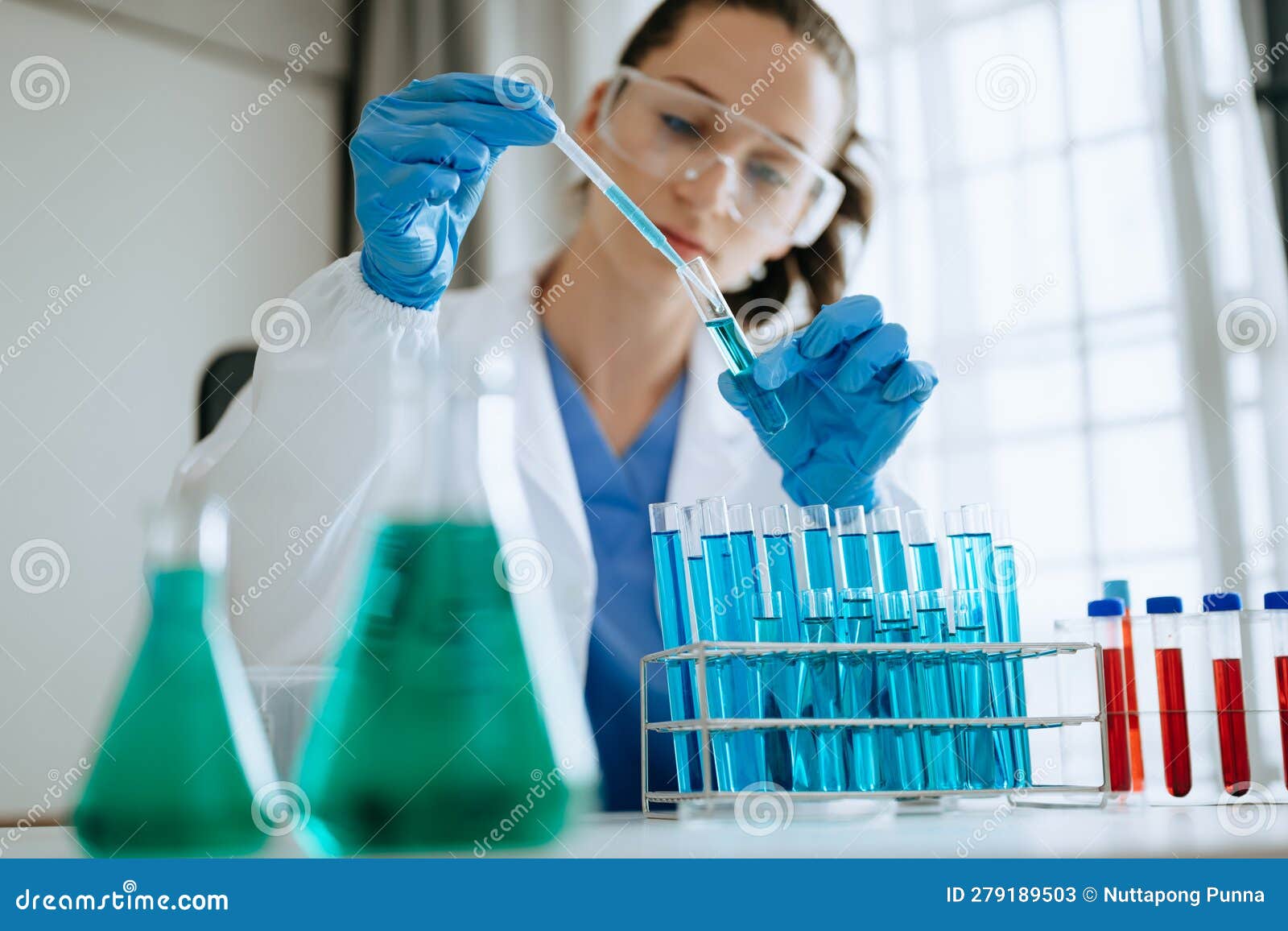 Modern Medical Research Laboratory. Female Scientist Working with Micro ...