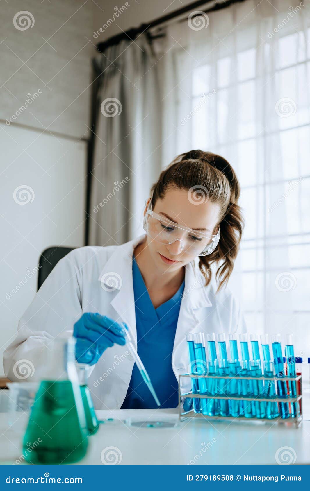 Modern Medical Research Laboratory. Female Scientist Working with Micro ...