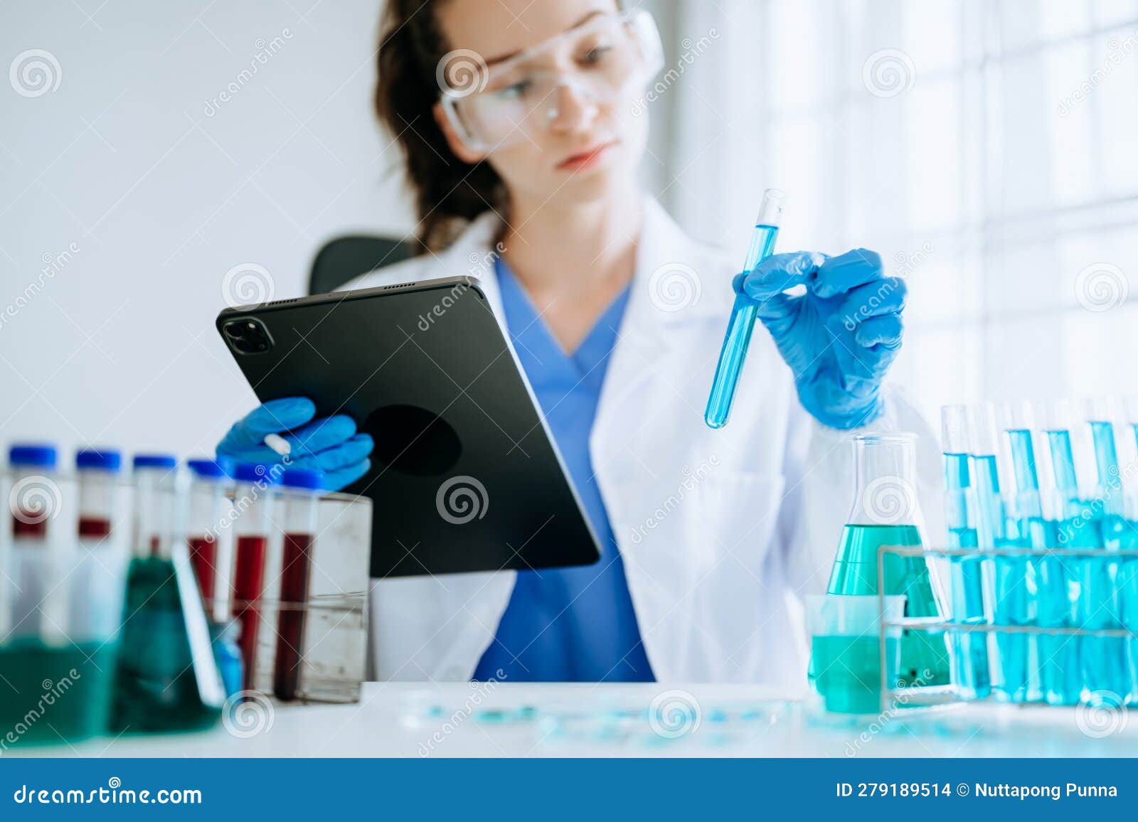 Modern Medical Research Laboratory. Female Scientist Working with Micro ...
