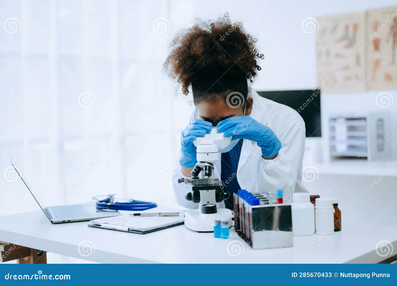 Modern Medical Research Laboratory. African Female Scientist Working ...