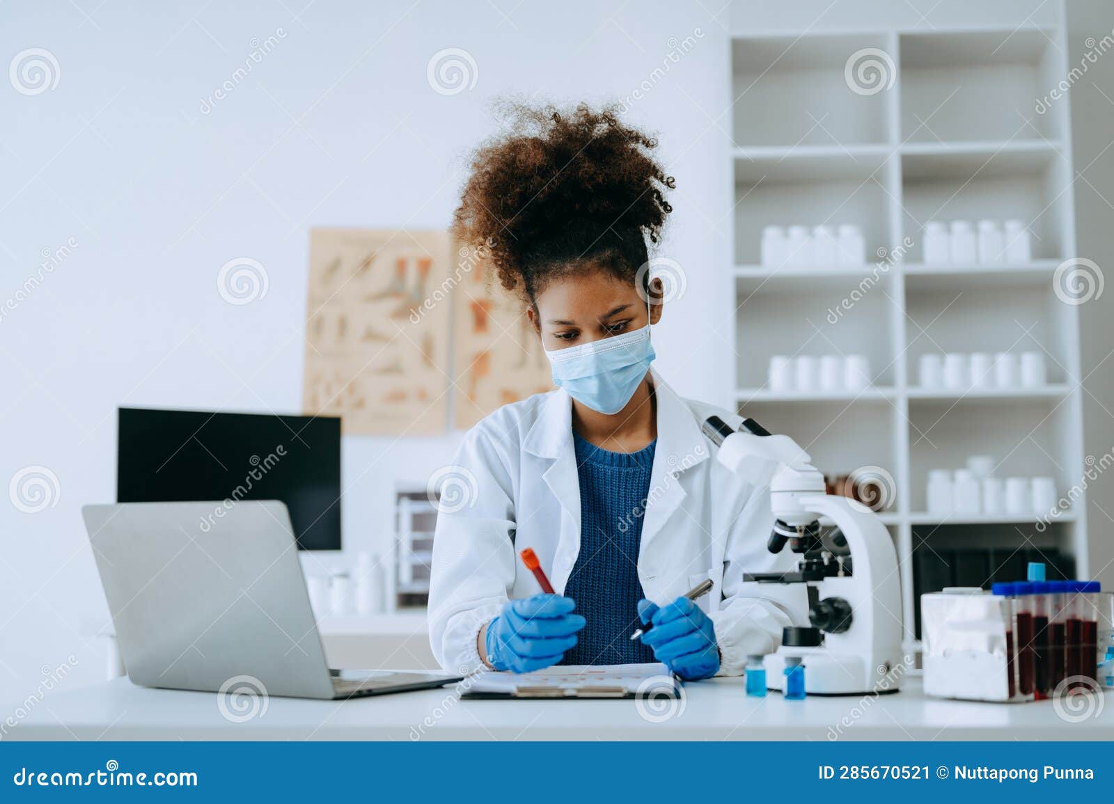 Modern Medical Research Laboratory. African Female Scientist Working ...