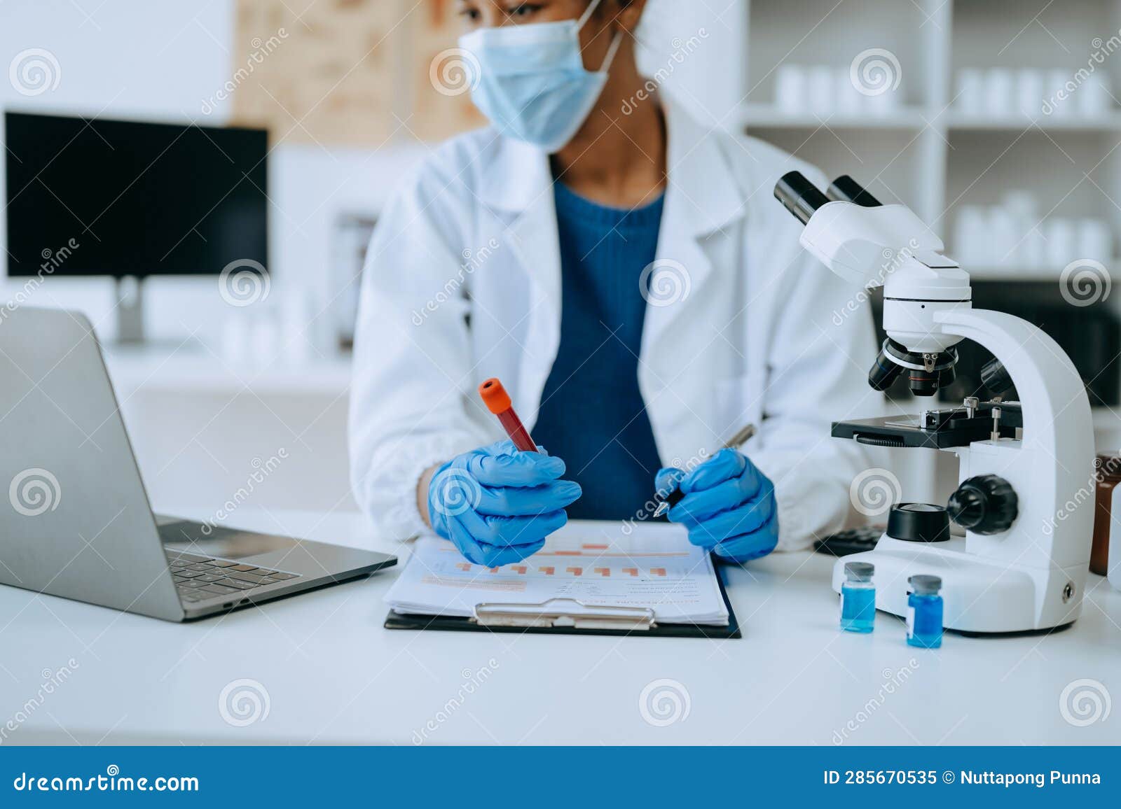 Modern Medical Research Laboratory. African Female Scientist Working ...