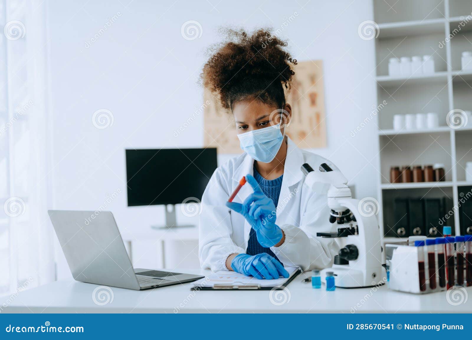Modern Medical Research Laboratory. African Female Scientist Working ...