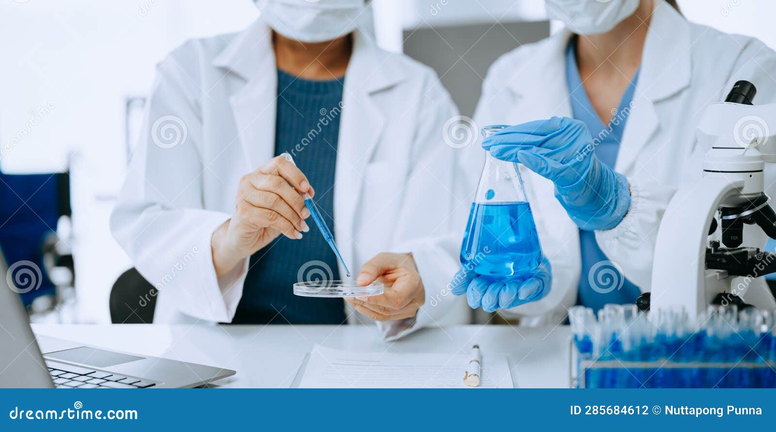 Modern Medical Research Laboratory. Female Scientist Working with Micro ...