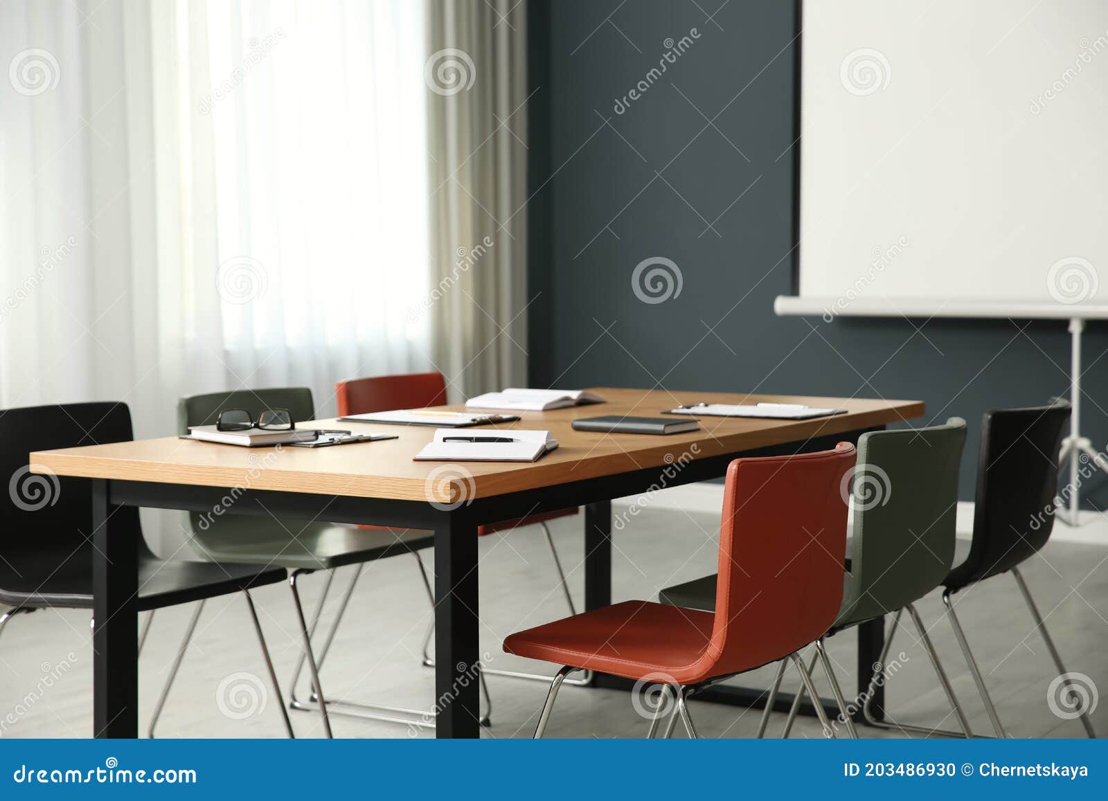 Modern Meeting Room Interior with Large Table and Projection Screen ...