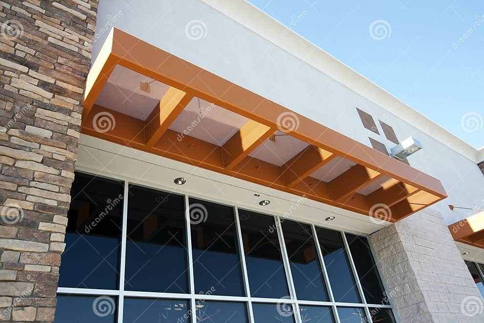Modern Metal Awning Over Storefront Stock Photo - Image of metal, glass ...