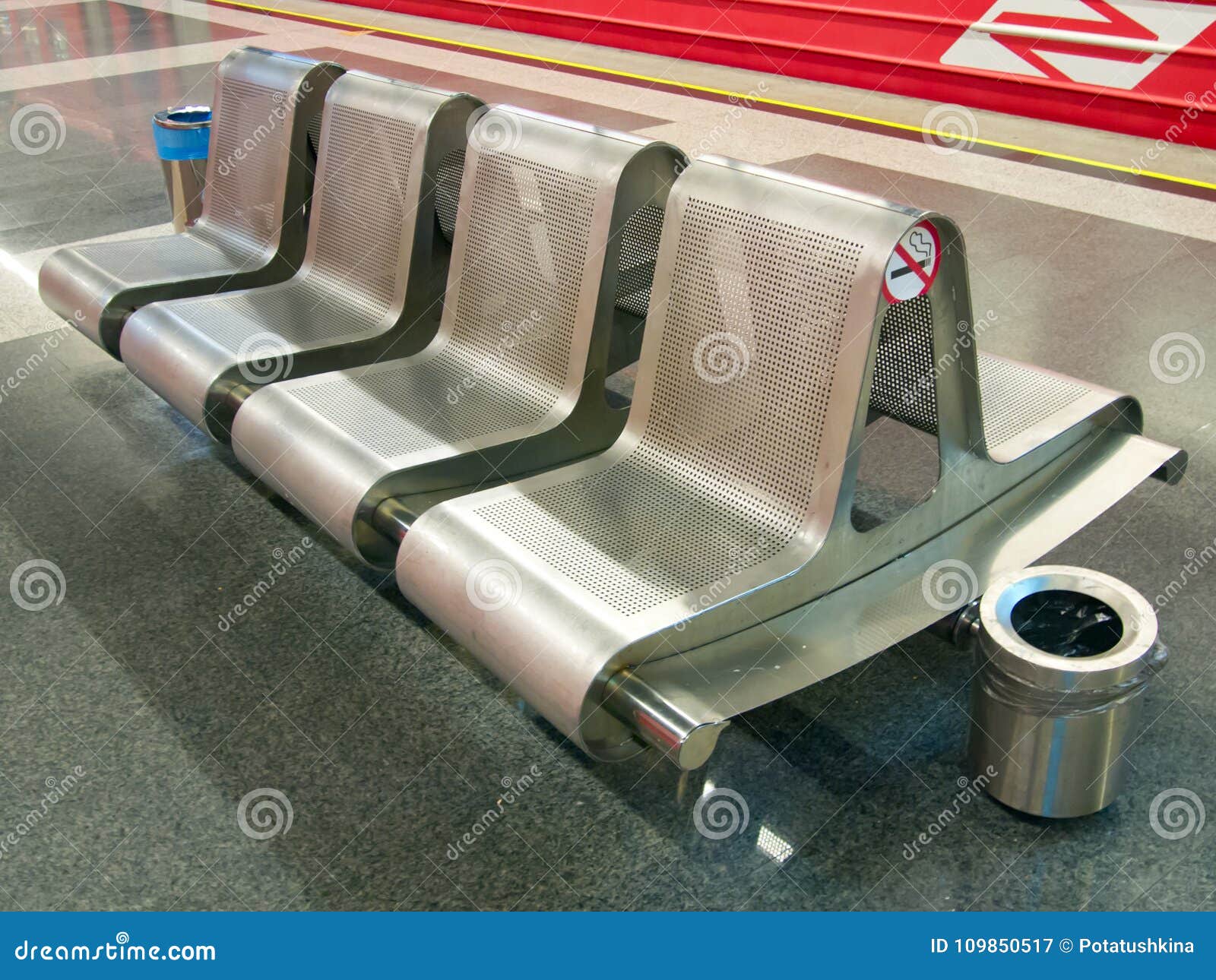 Metal Benches Or Seating With Fabric Covering Overhead And Cement Steps ...