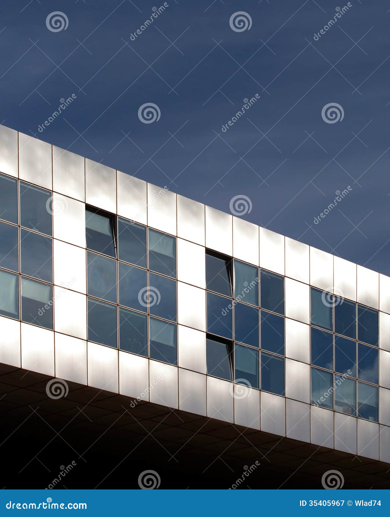 Modern Metallic Architecture Against a Blue Sky Stock Image - Image of ...